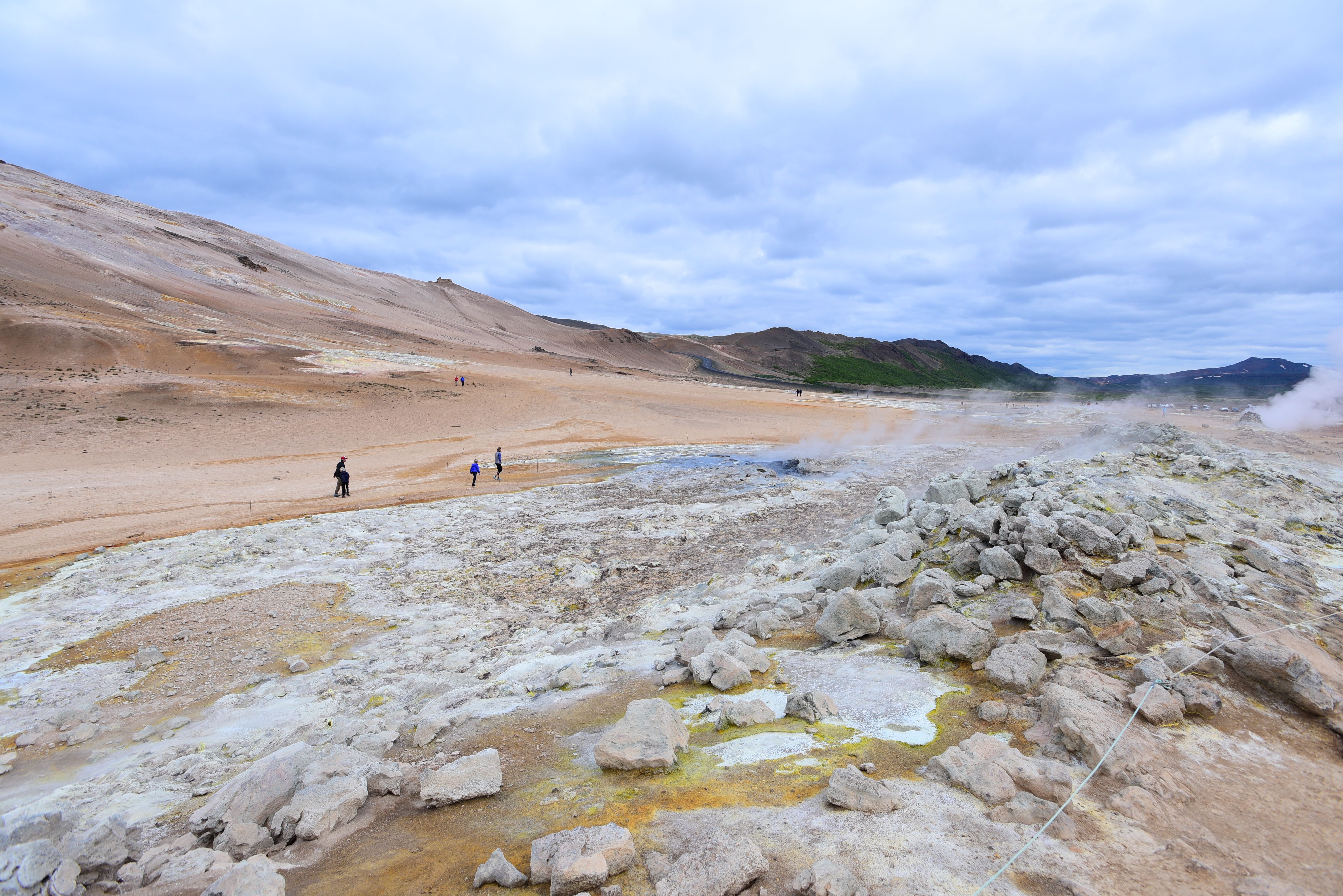 Geothermal Landscape in Iceland with Tourists · Free Stock Photo