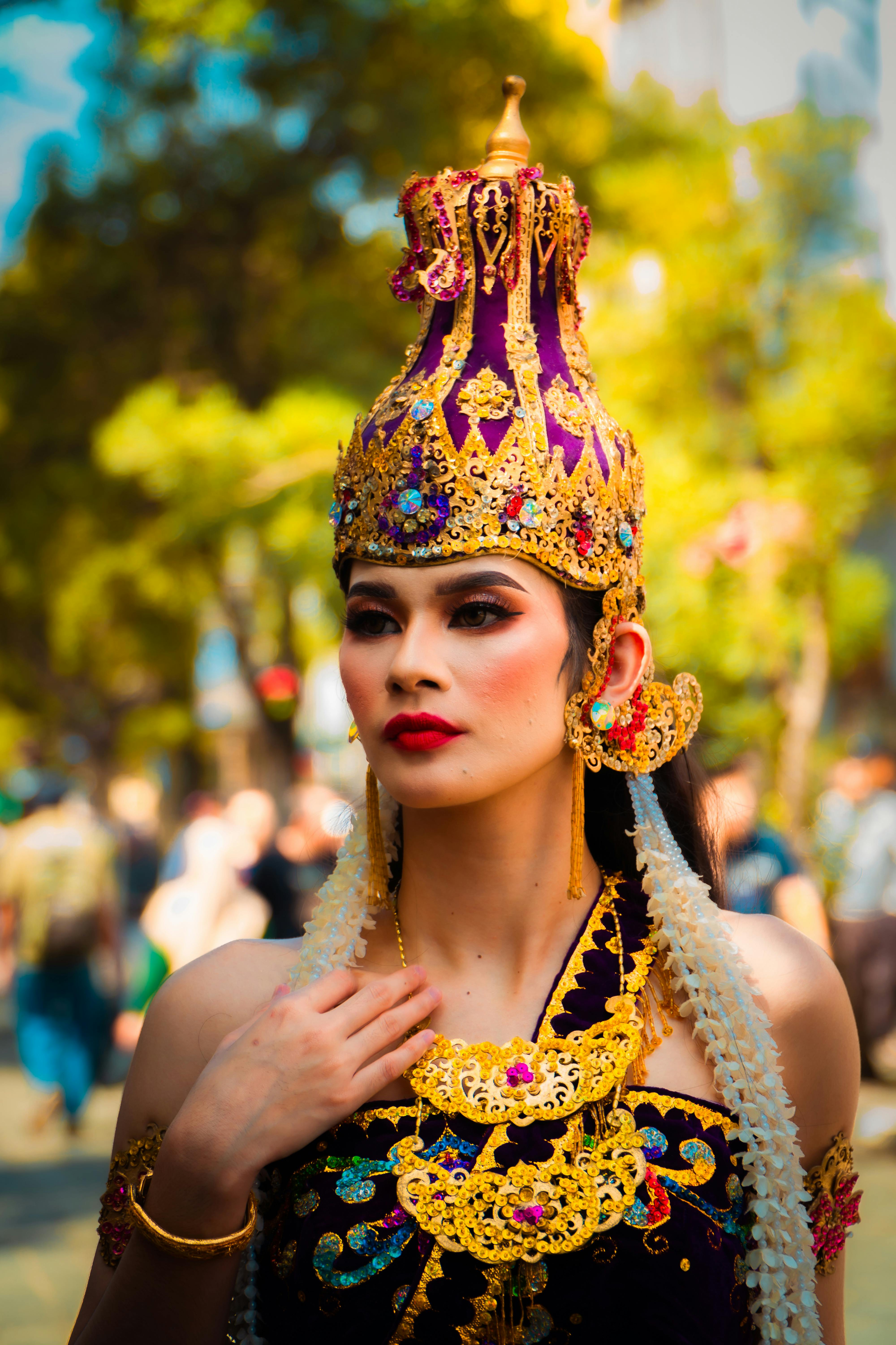 Woman in Traditional Southeast Asian Costume Outdoors · Free Stock Photo