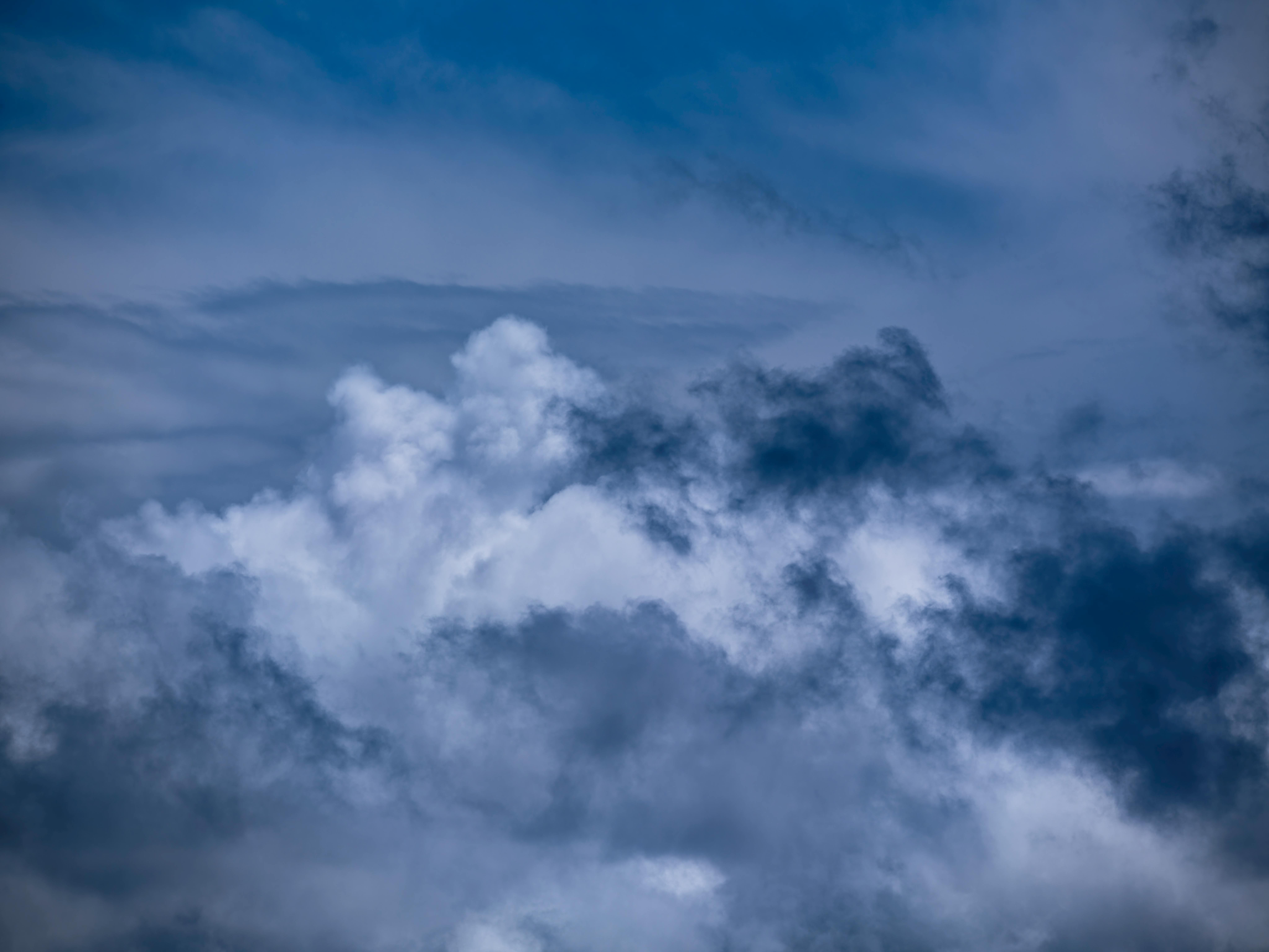 Dramatic Cumulus Clouds in a Blue Sky · Free Stock Photo