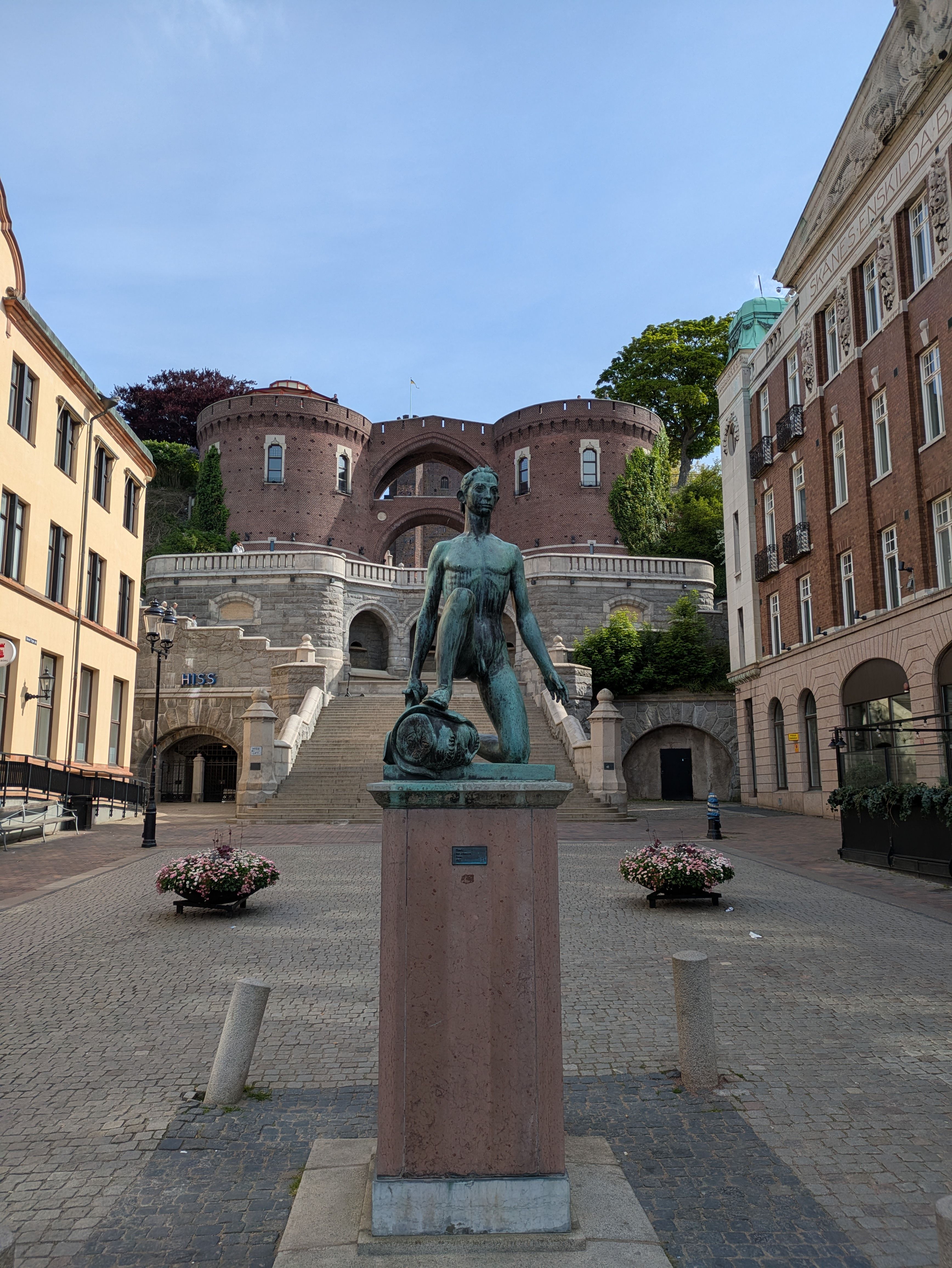 Kärnan Tower and Carl Milles' Poseidon Statue · Free Stock Photo
