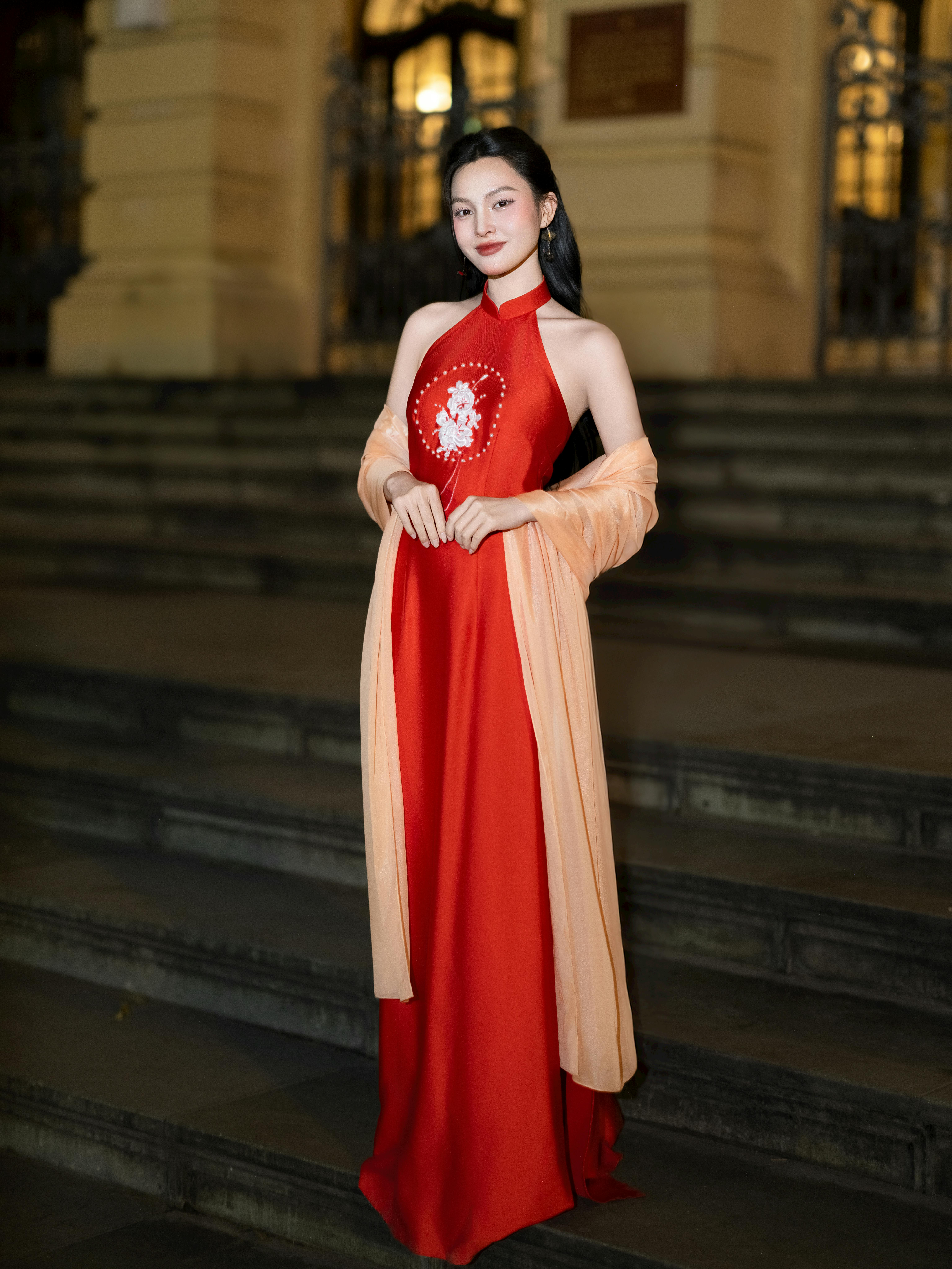 Elegant Woman in Red Dress on Stairs at Night · Free Stock Photo