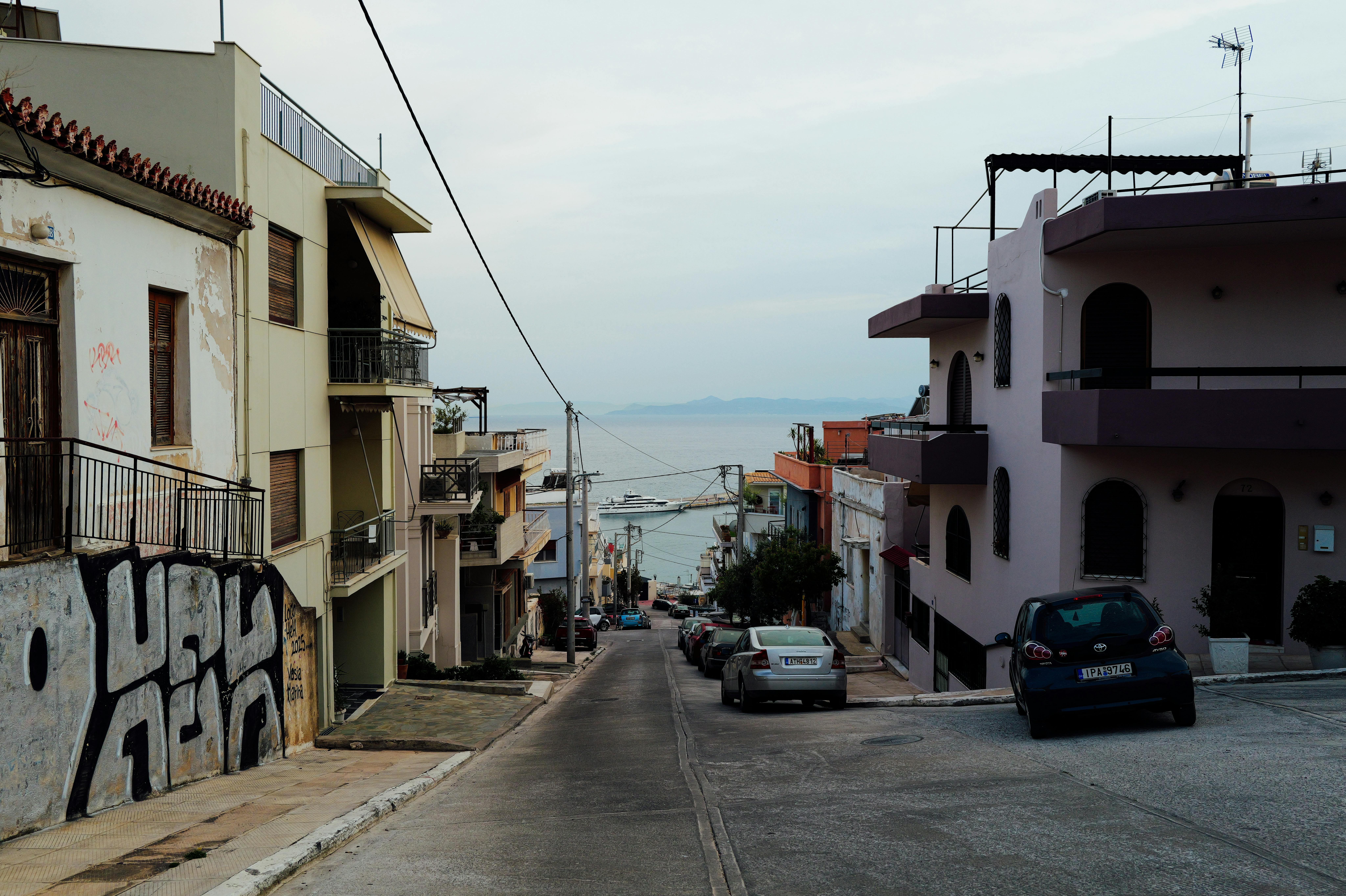 Scenic Urban Street with Sea View · Free Stock Photo