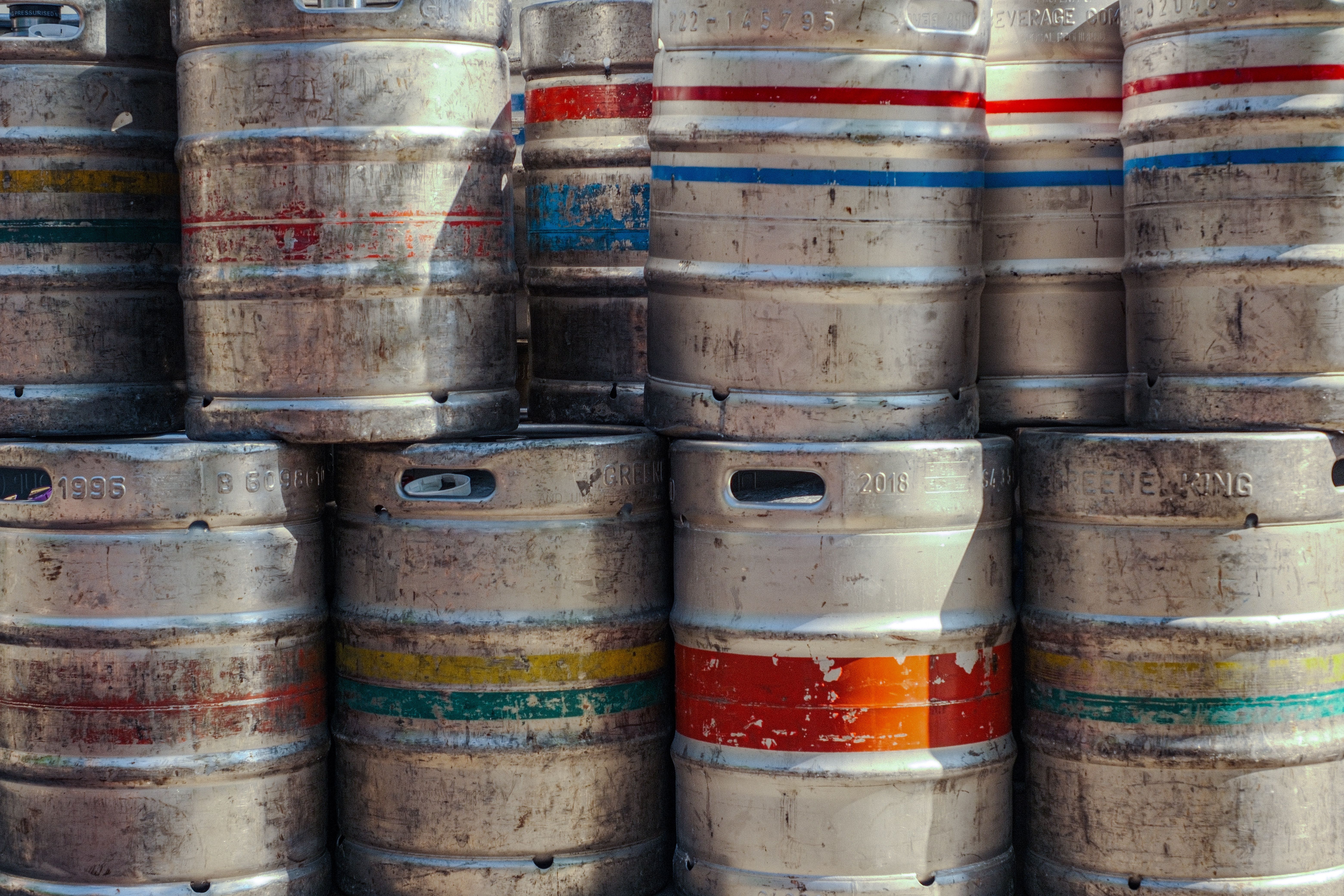 Stack of Colorful Beer Barrels in Rochester Pub · Free Stock Photo