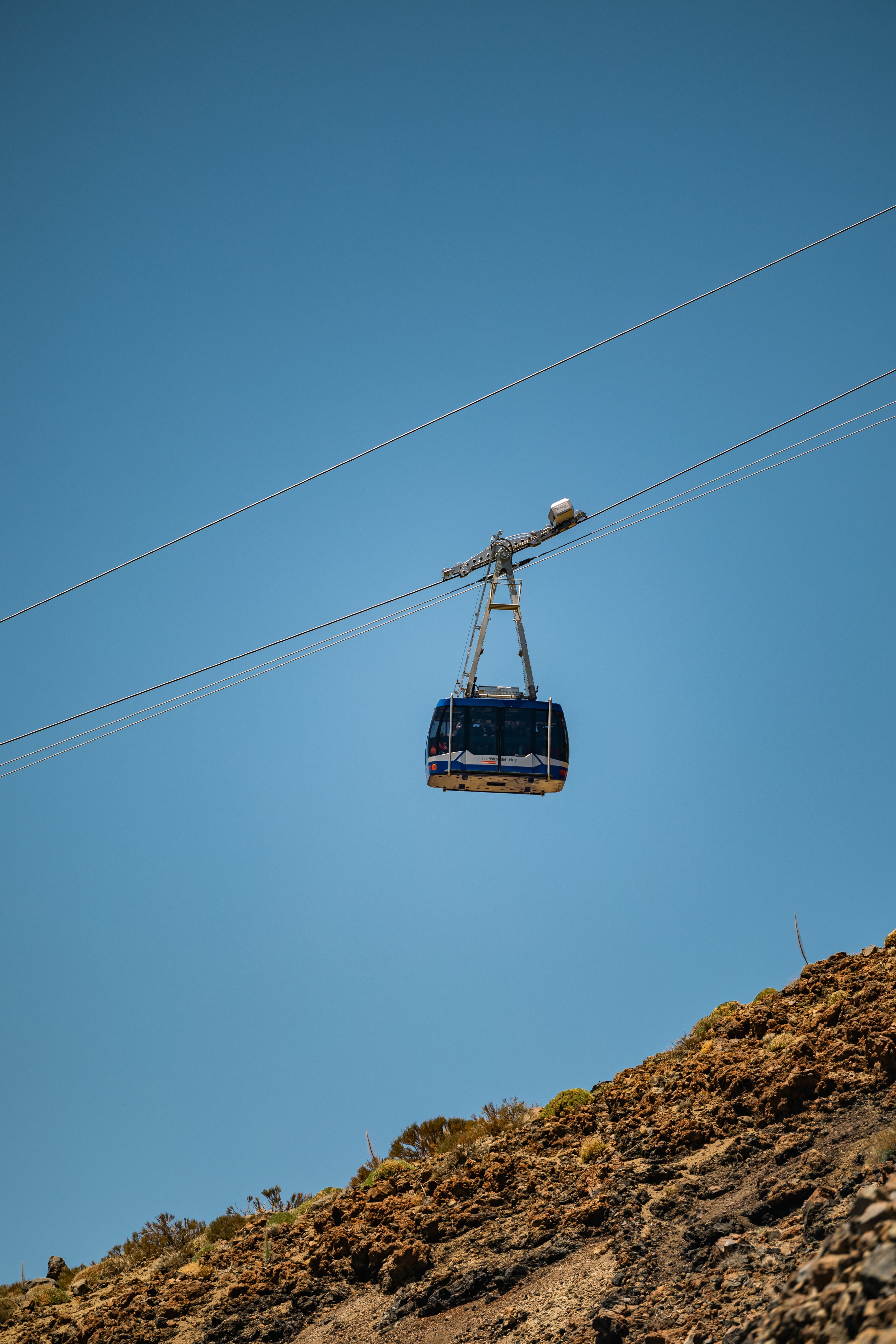 Cable Car Descending in Mountain Landscape · Free Stock Photo