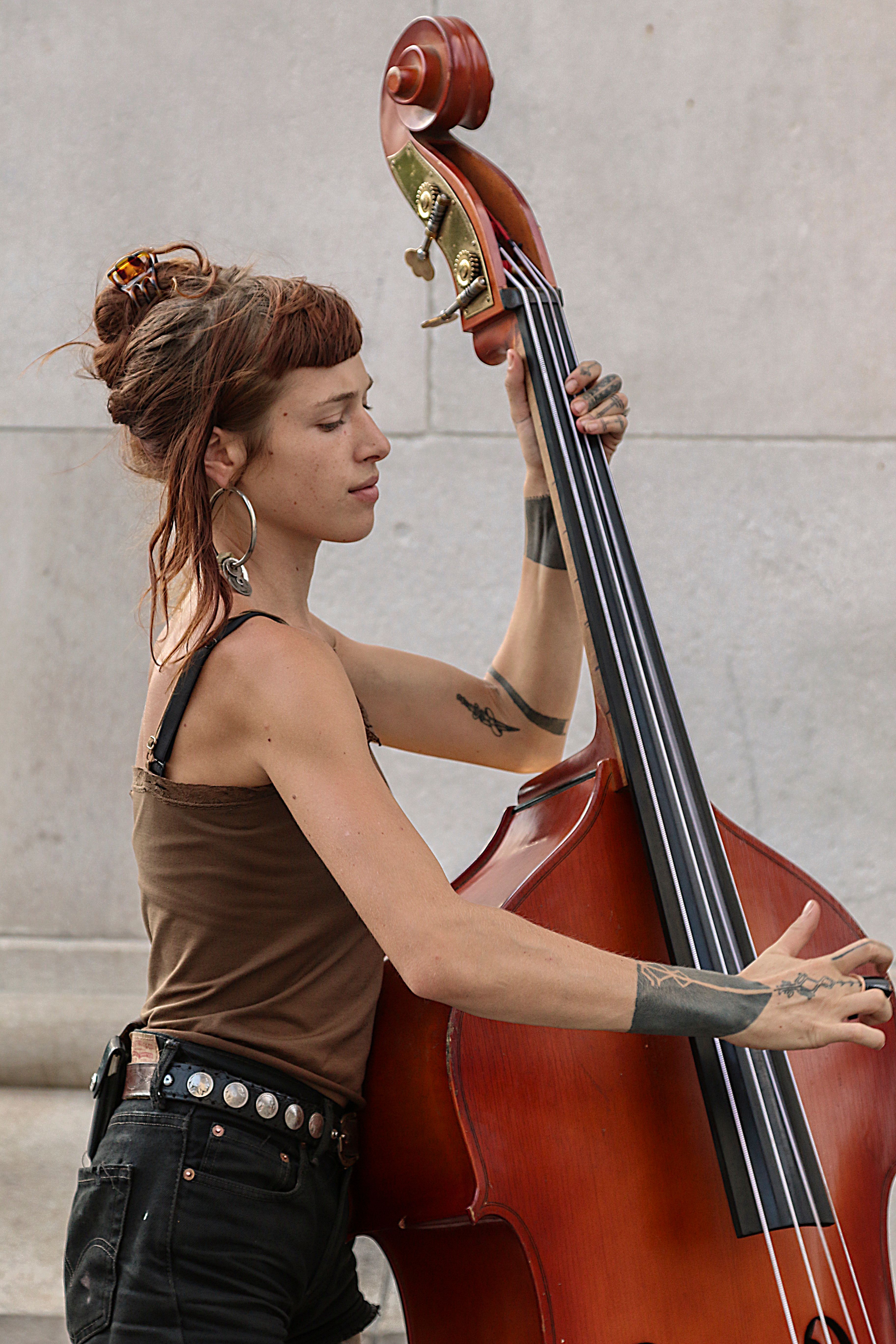Street Musician with Double Bass Performance · Free Stock Photo