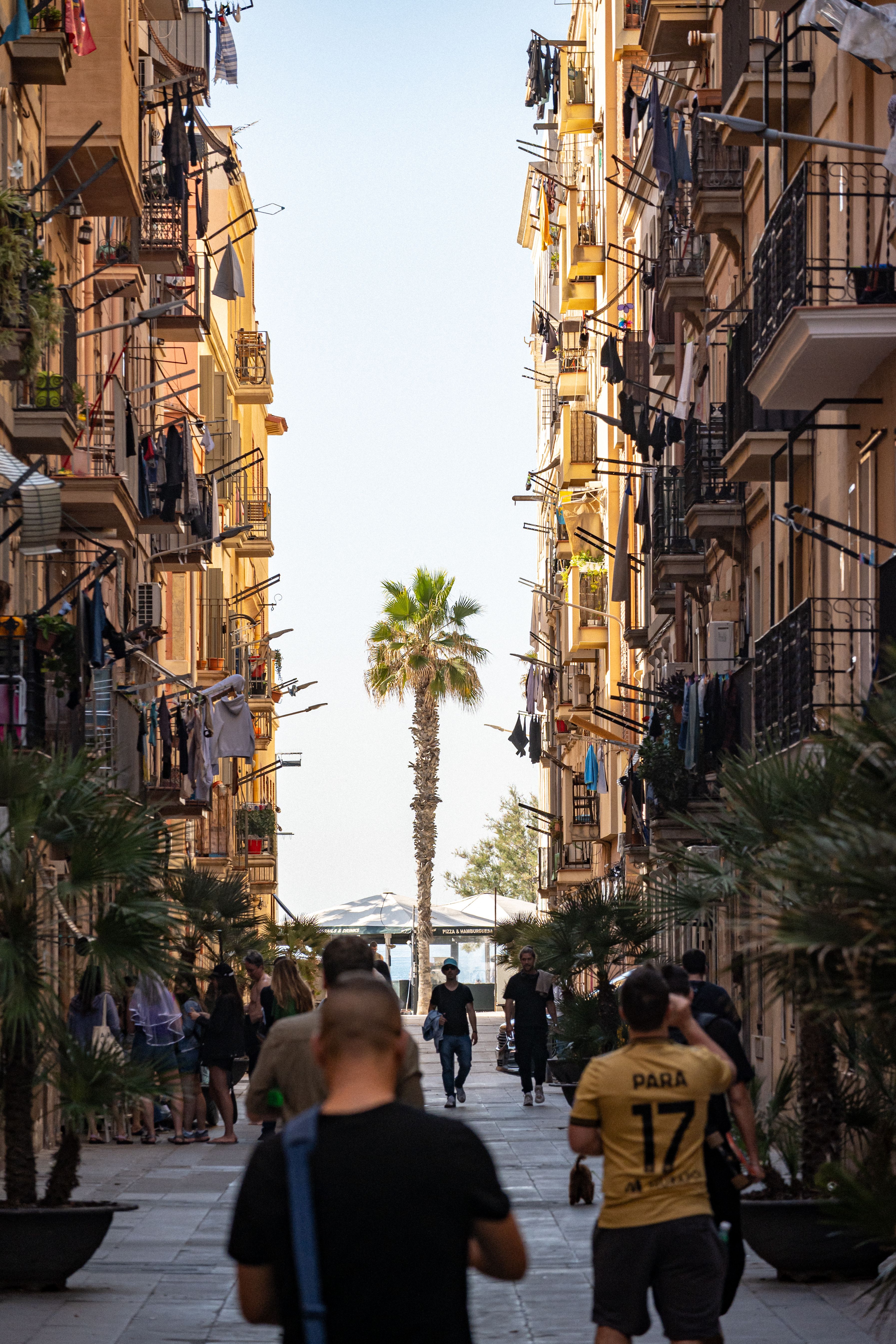 Urban Street Leading to a Coastal Beach View · Free Stock Photo