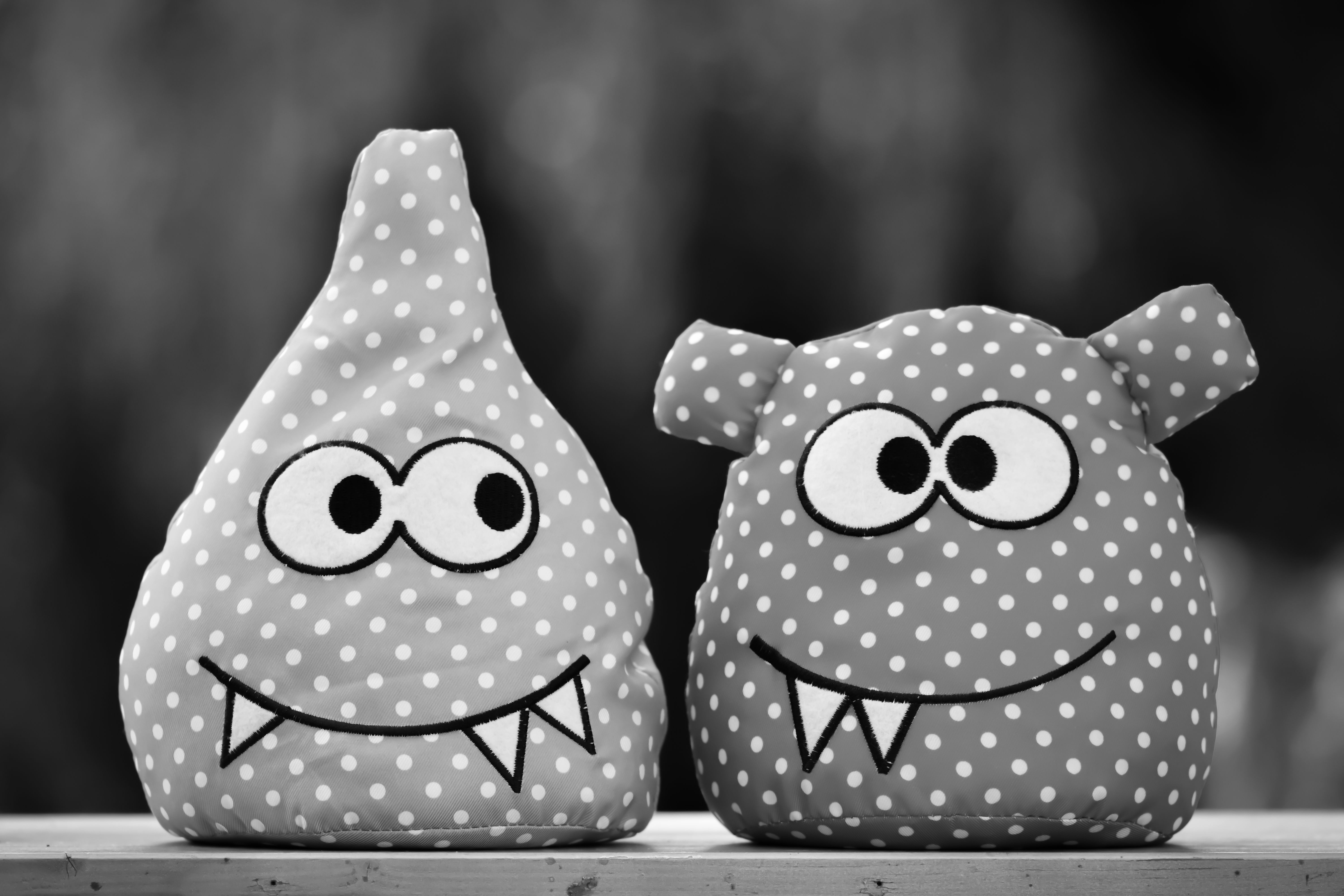 Cute Polka Dot Monster Toys on Display · Free Stock Photo