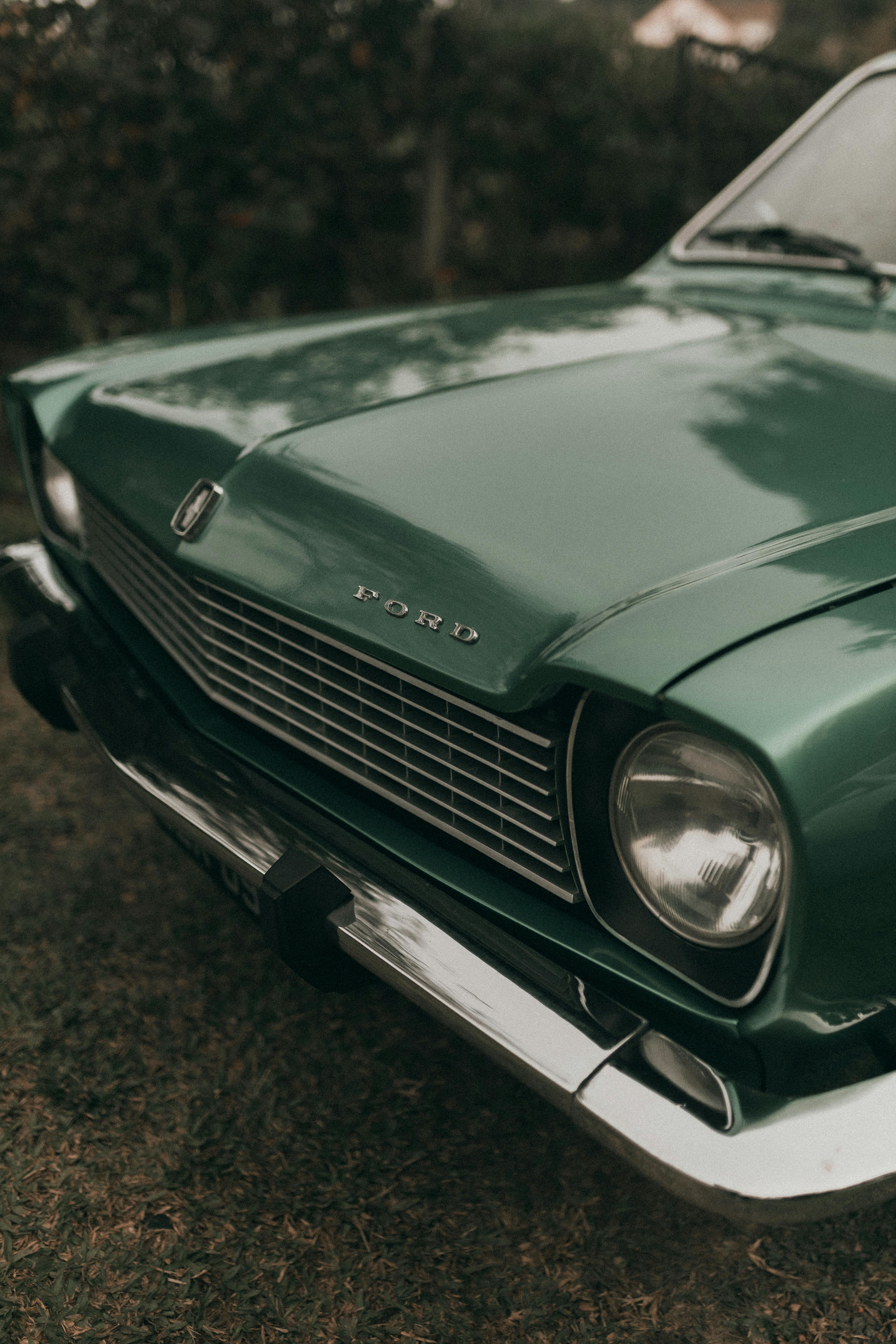 Vintage Green Ford Car Front View in Nature · Free Stock Photo