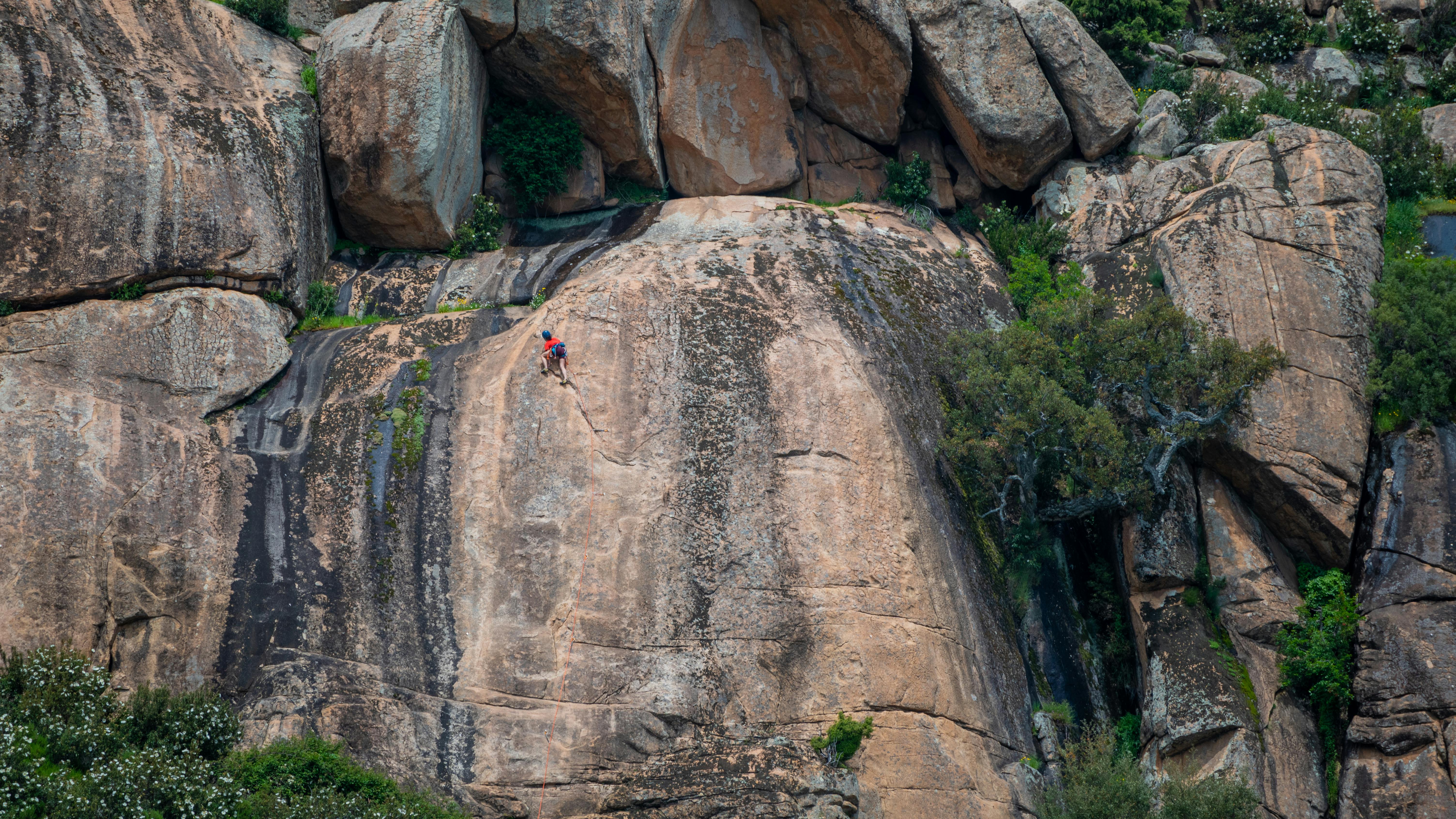 Rock Climber Ascending Manzanares el Real Cliff · Free Stock Photo