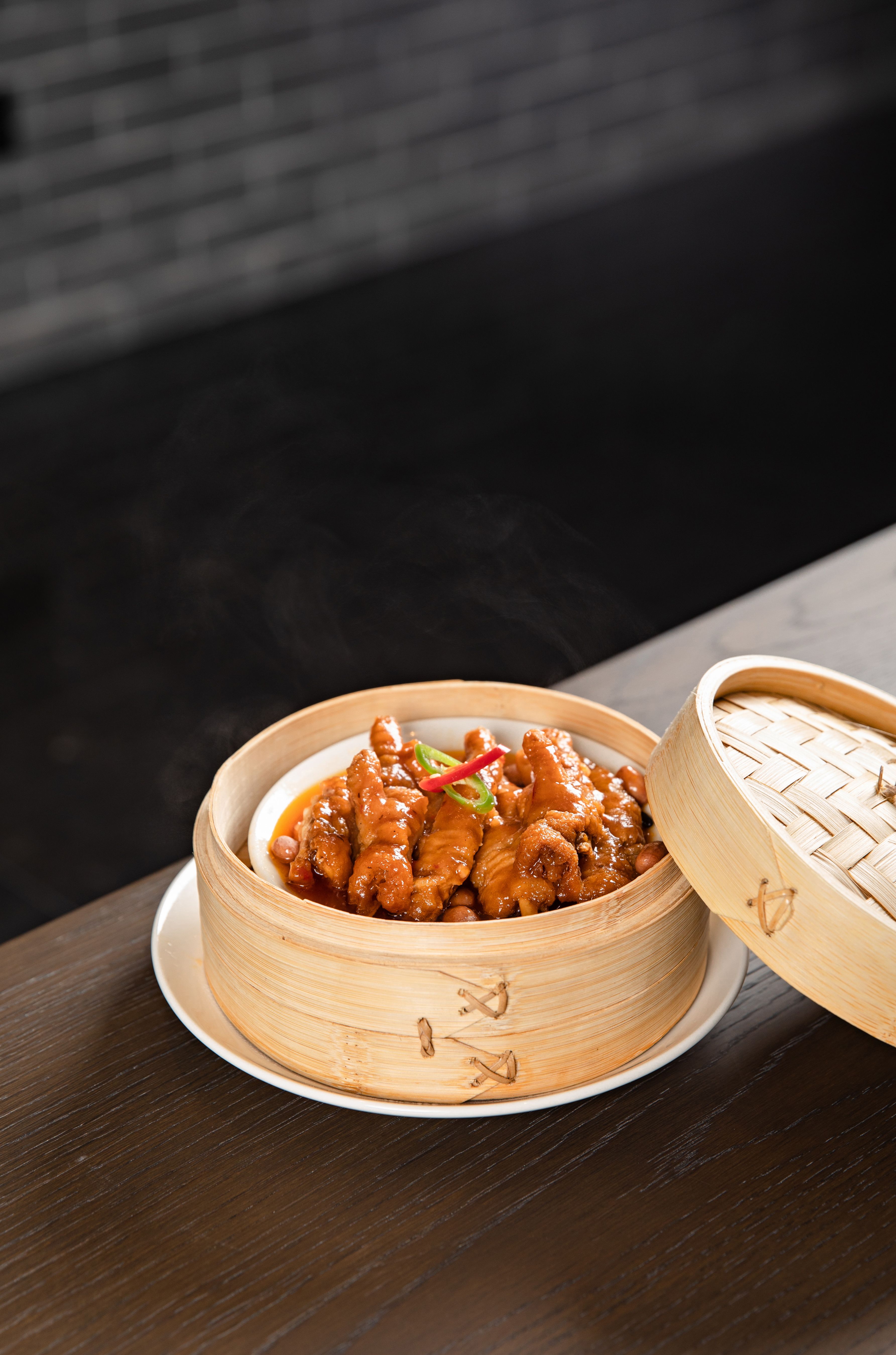 Delicious Chicken Feet Dim Sum in Bamboo Basket · Free Stock Photo