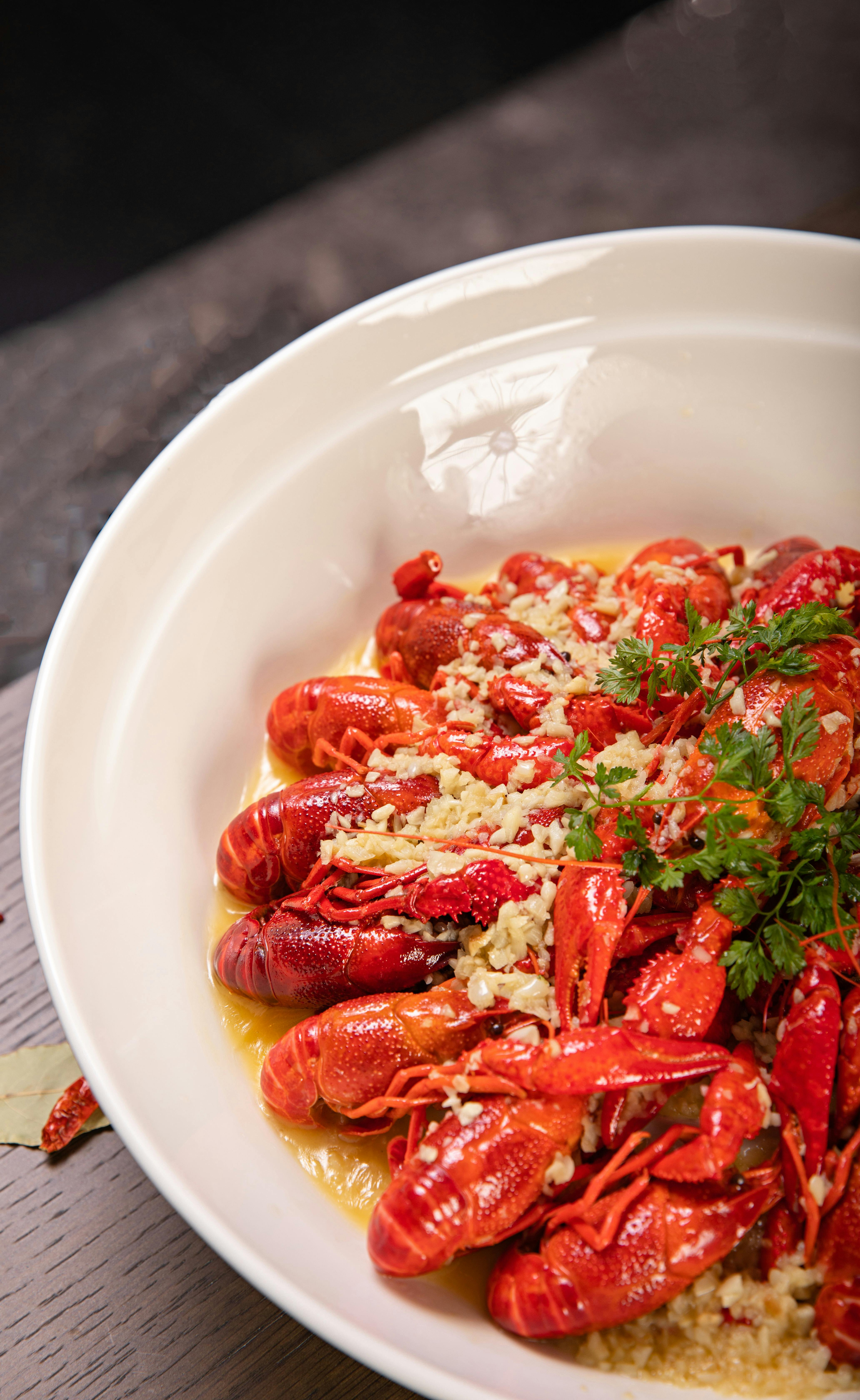 Delicious Boiled Crawfish with Garlic and Herbs · Free Stock Photo