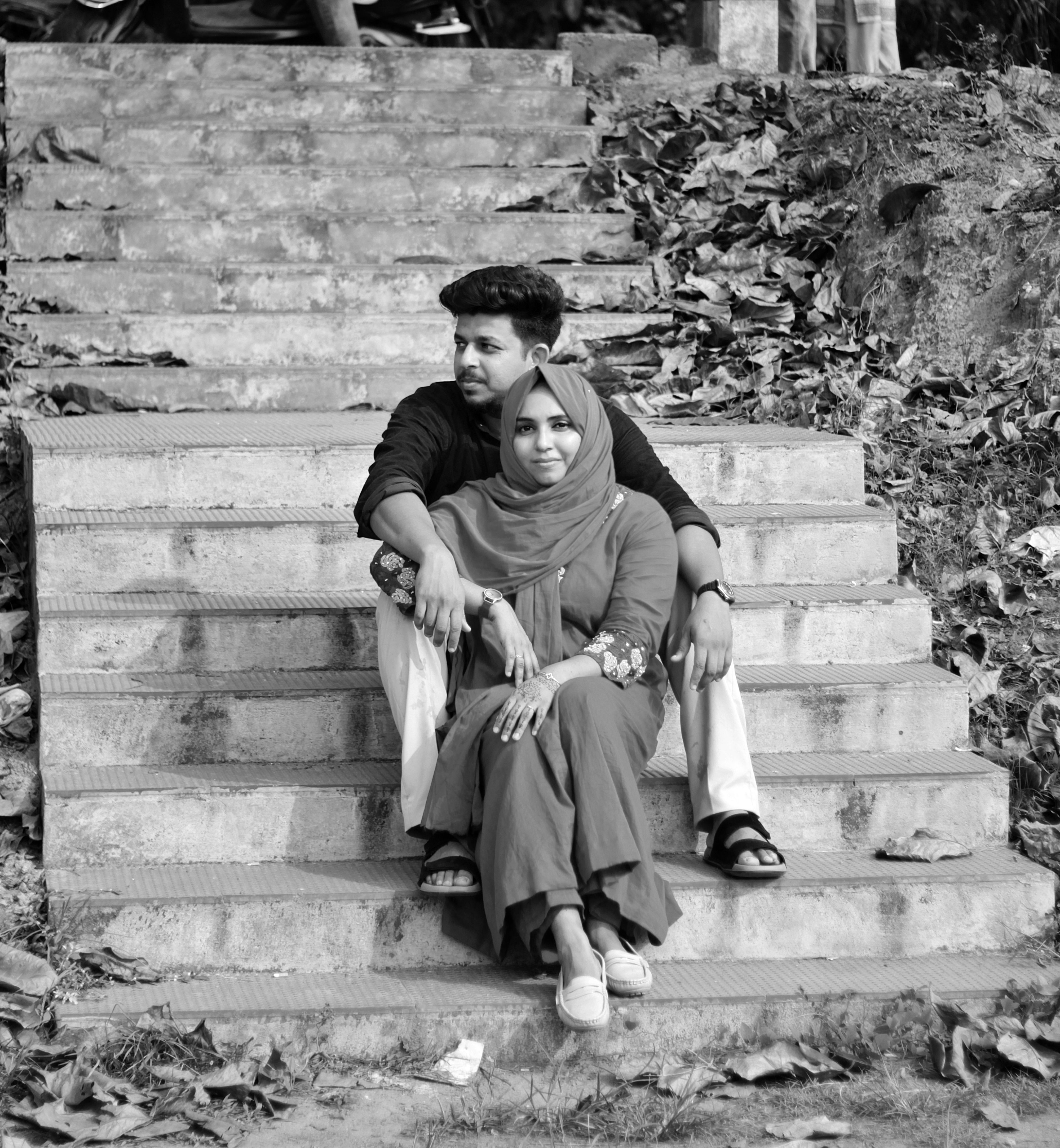 Romantic Couple Sitting on Outdoor Steps · Free Stock Photo