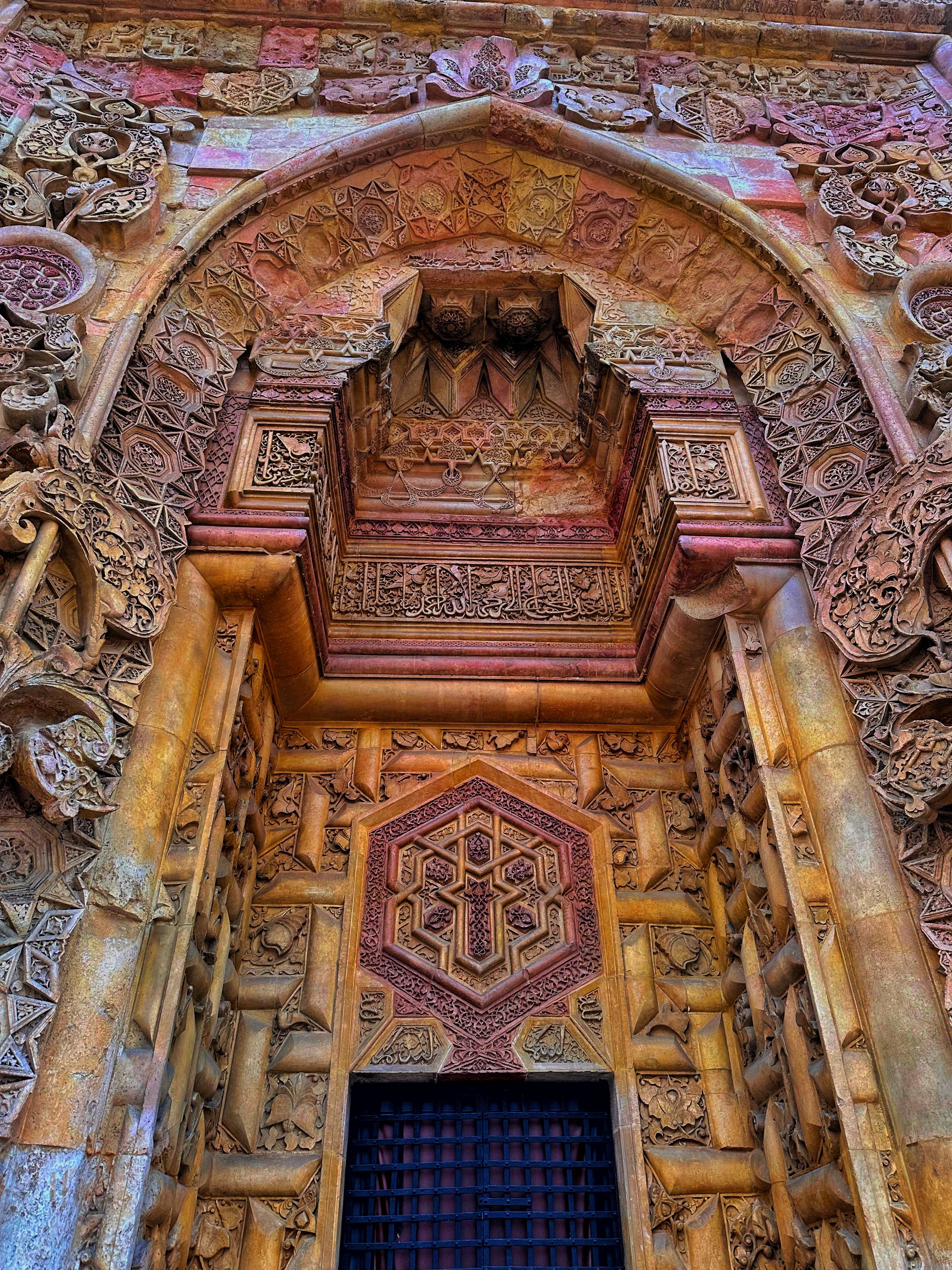 Ornate Architectural Stonework Entrance · Free Stock Photo