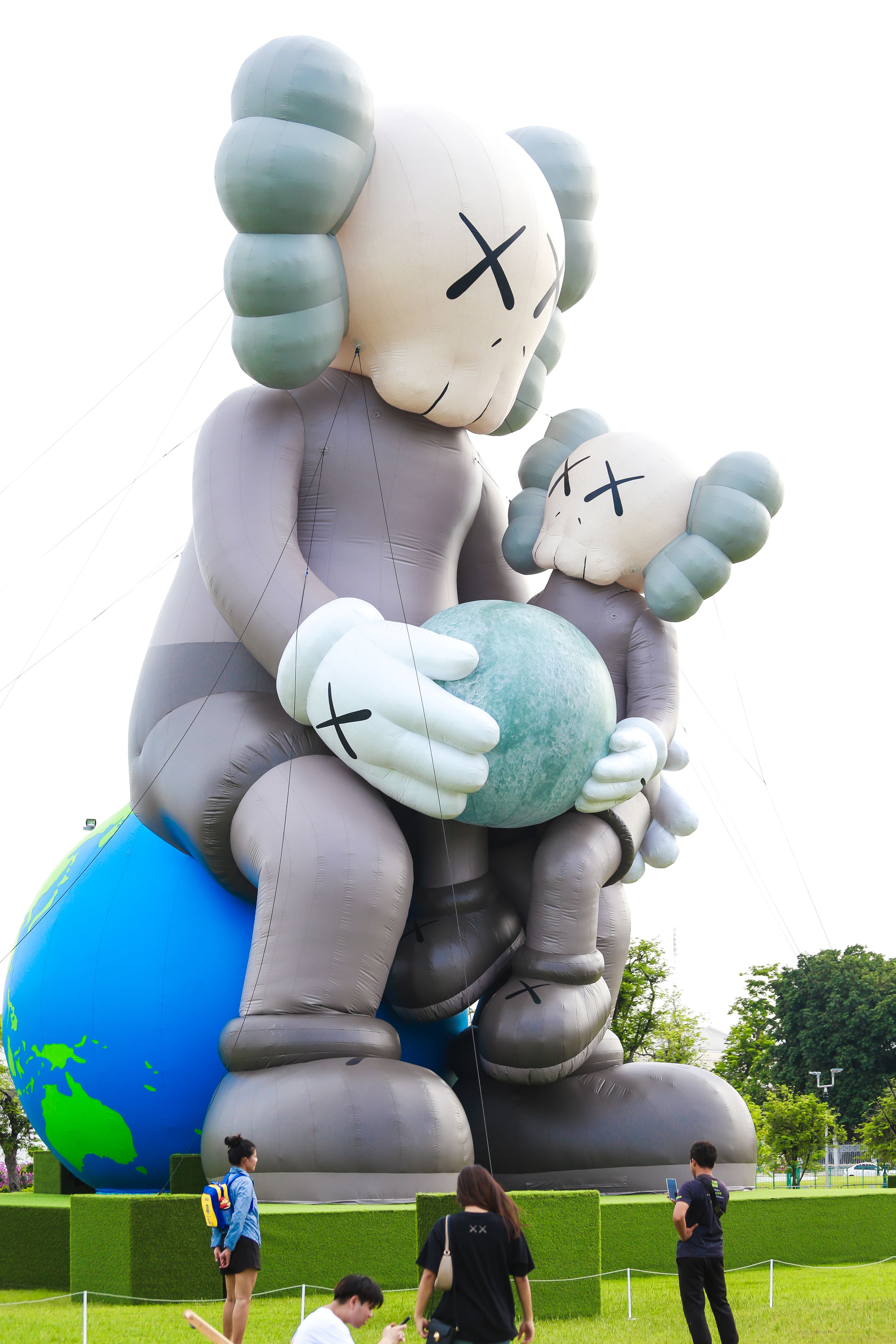 Giant Inflatable Sculptures Outdoors with People · Free Stock Photo