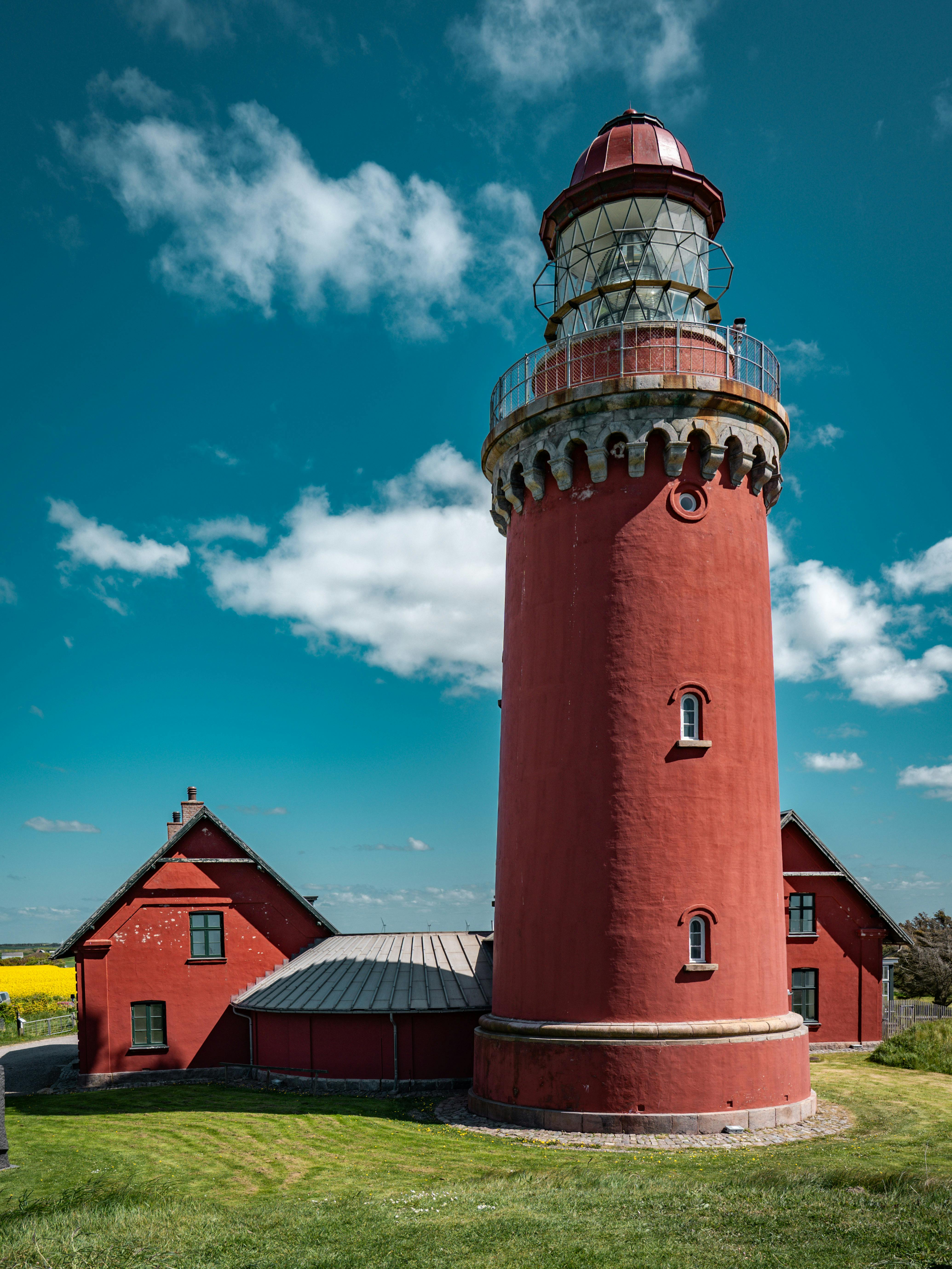 Majestic Red Lighthouse in Danish Countryside · Free Stock Photo
