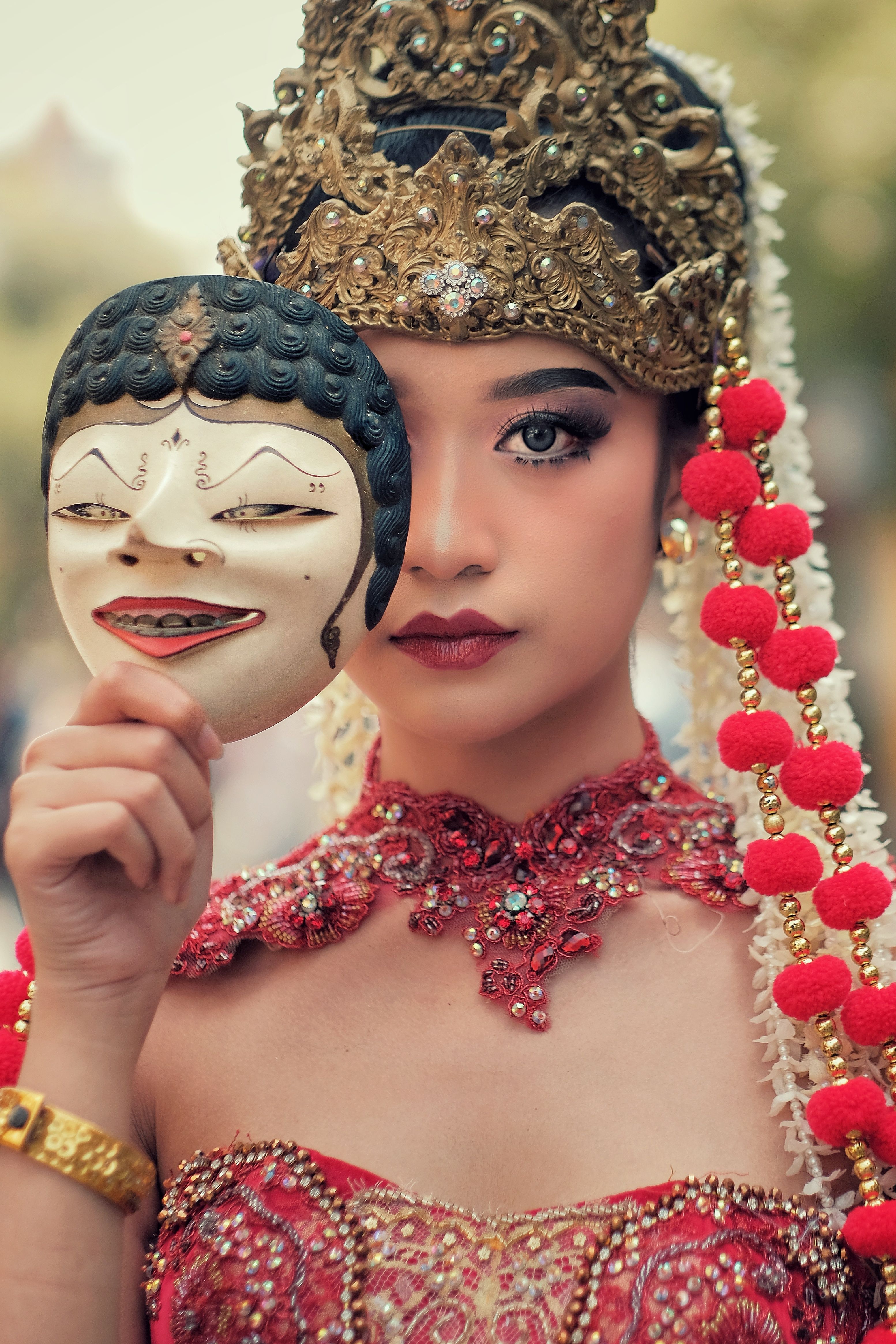 Traditional Balinese Dancer Holding Mask · Free Stock Photo