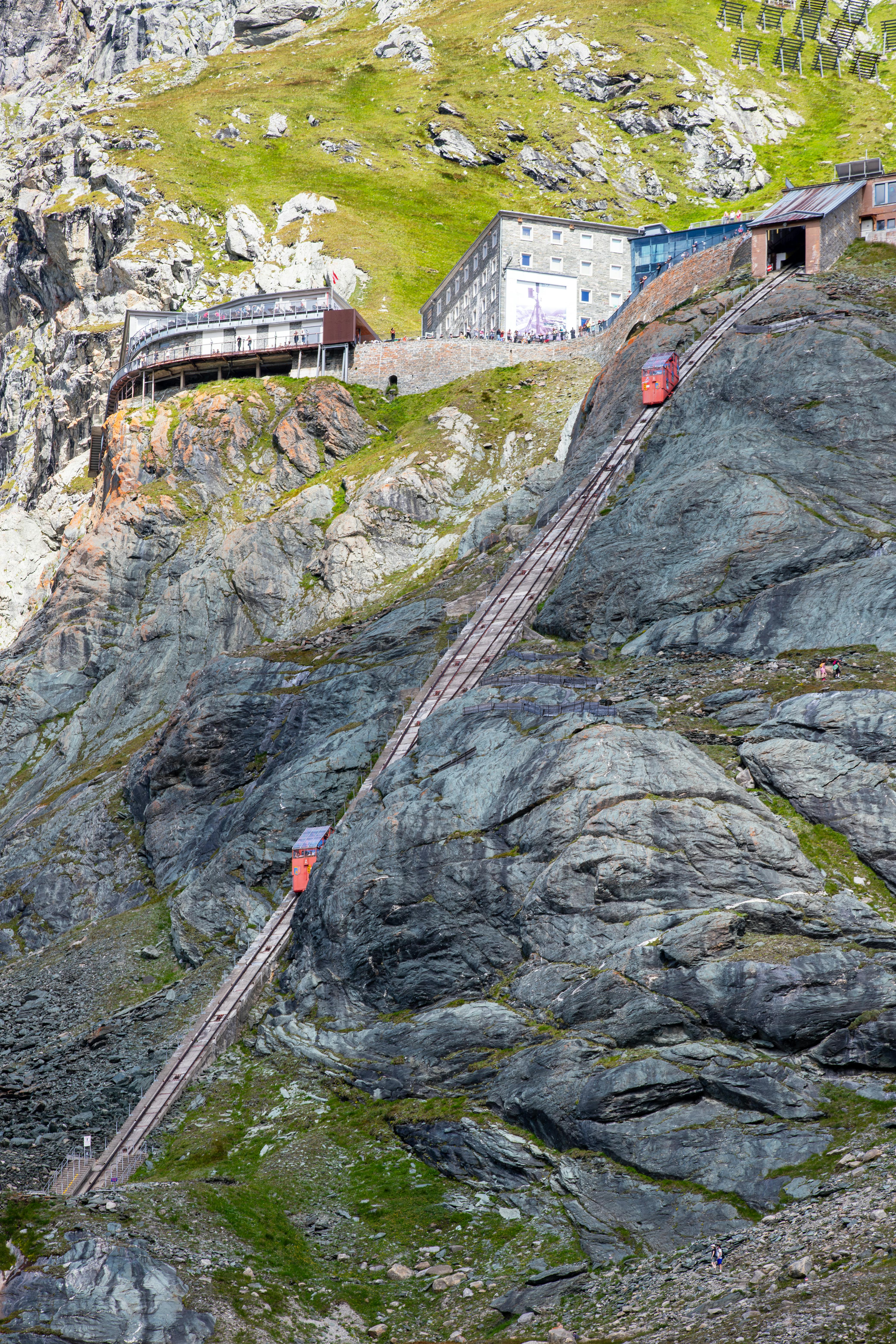 Rustic Alpine Train on Steep Rocky Slope · Free Stock Photo