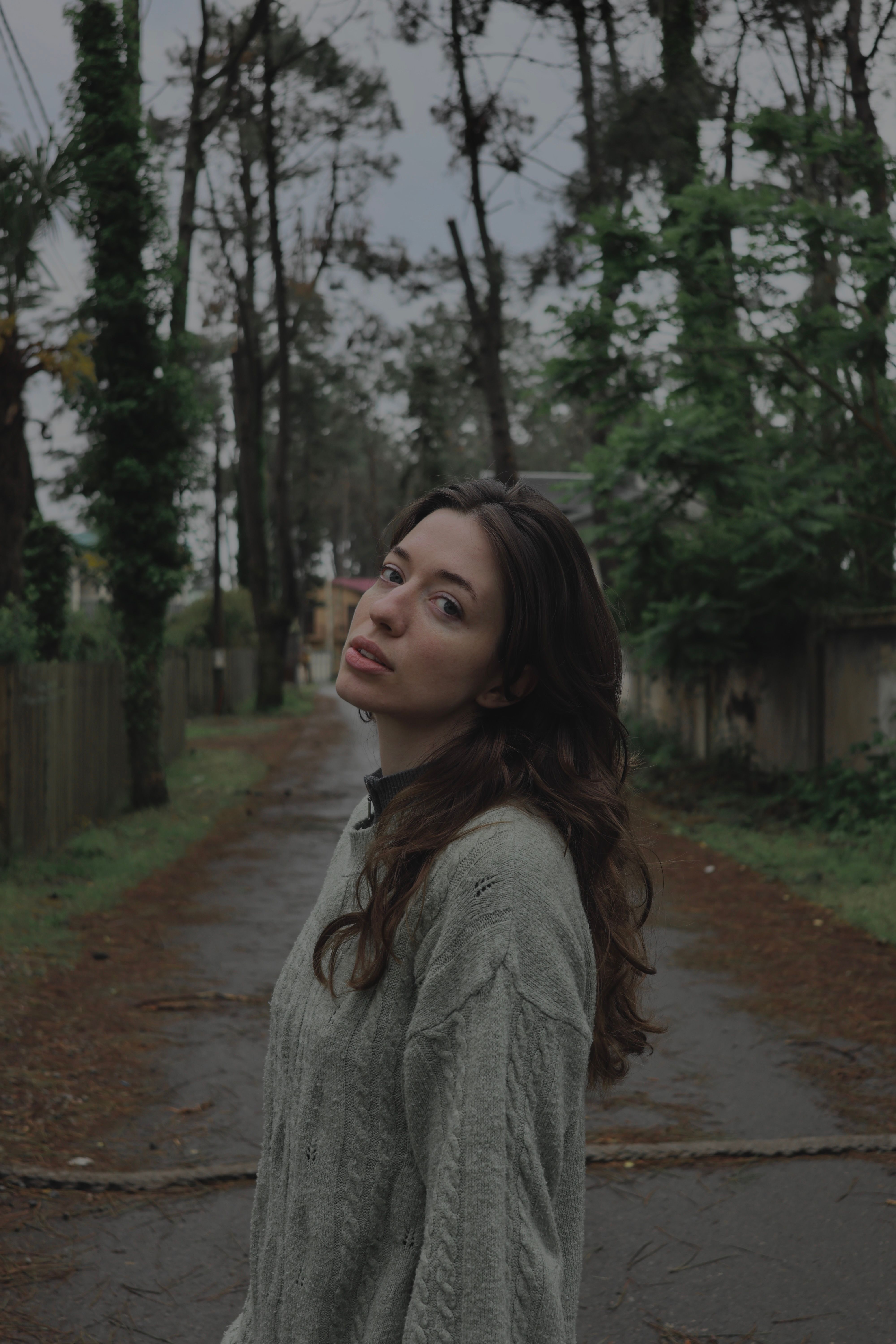 Portrait of Woman in Tree-Lined Pathway · Free Stock Photo