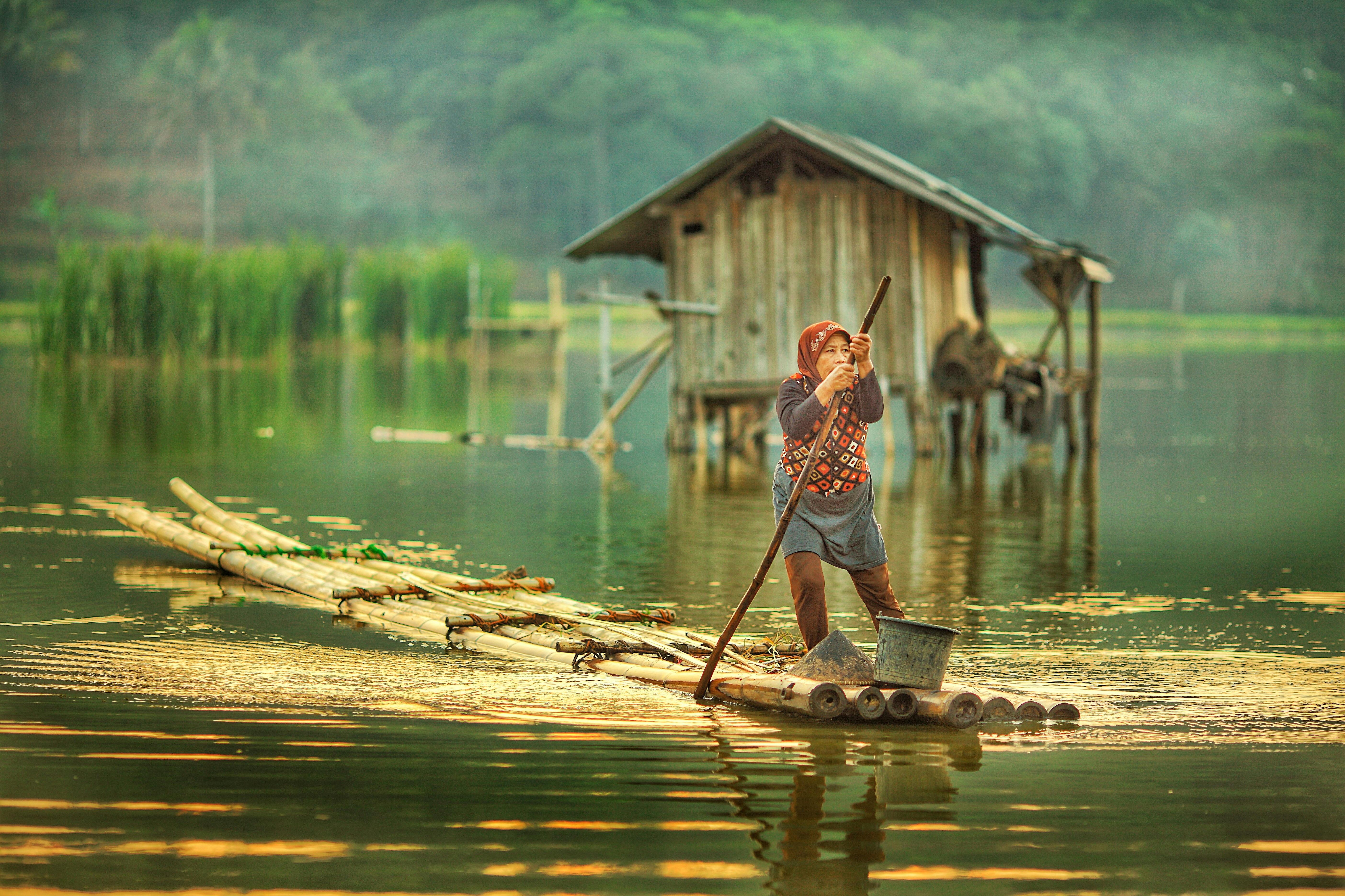 Traditional Bamboo Rafting in Serene West Java Lake · Free Stock Photo