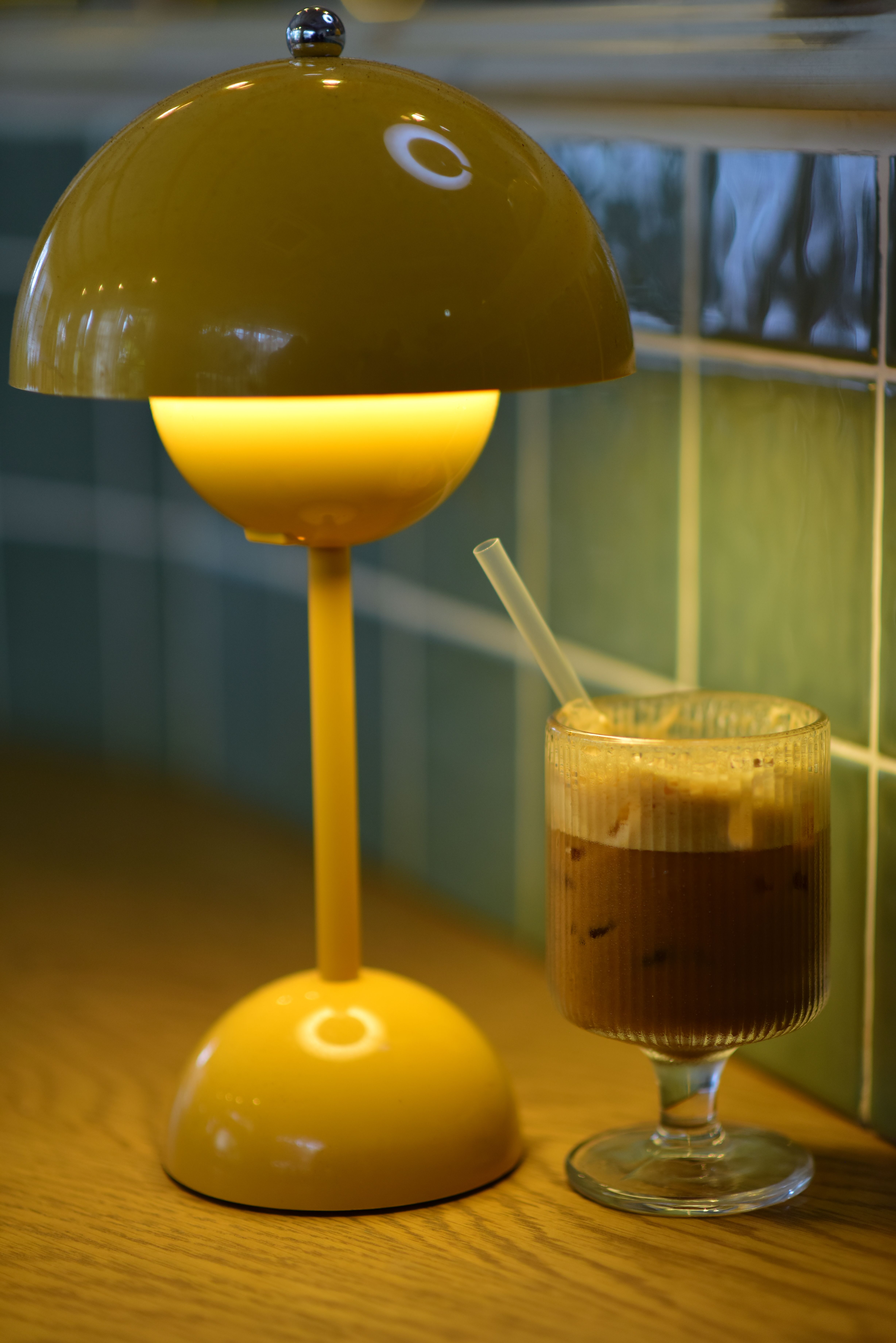 Cozy Indoor Scene with Lamp and Iced Coffee · Free Stock Photo