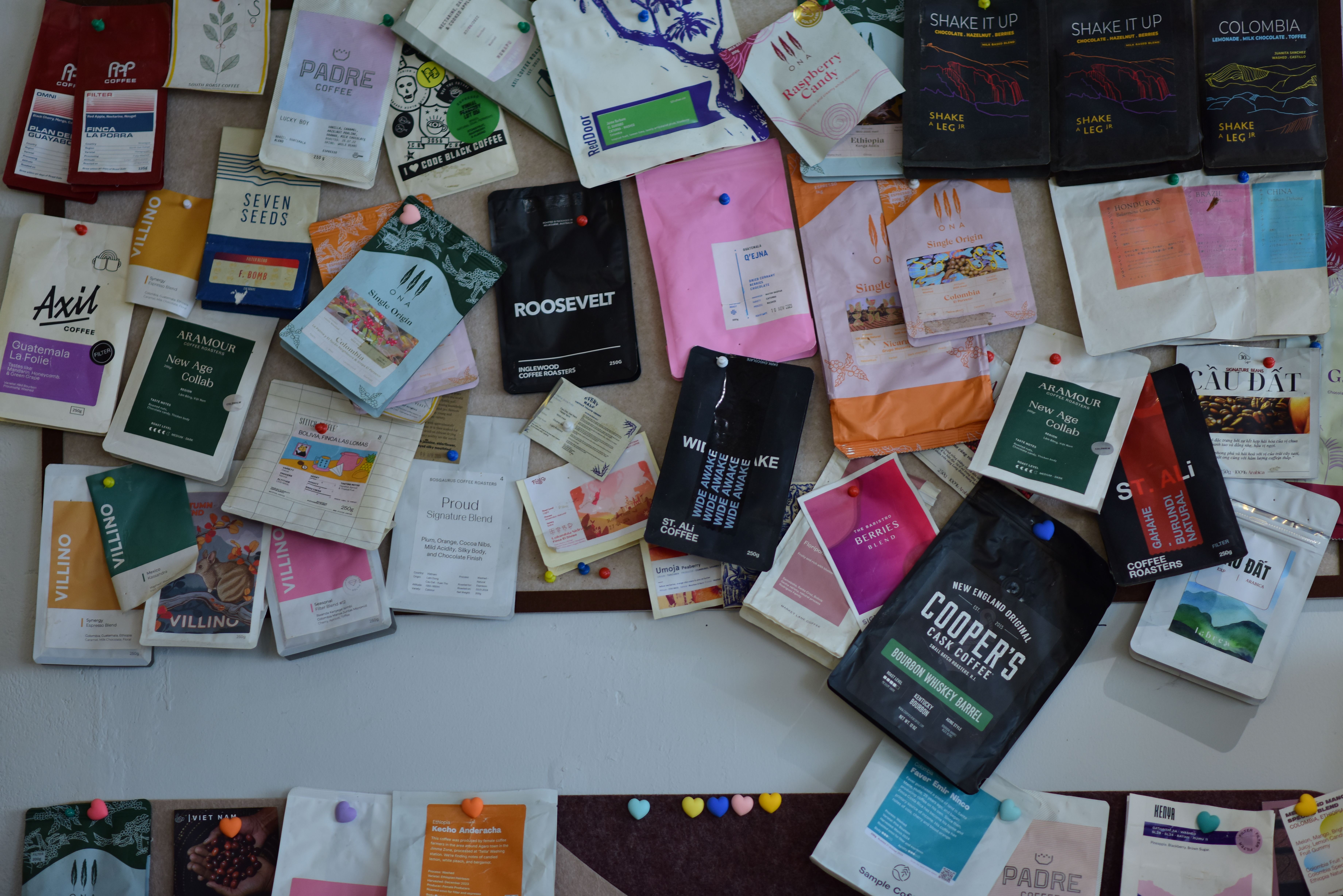 Creative Display of Colorful Coffee Packaging · Free Stock Photo