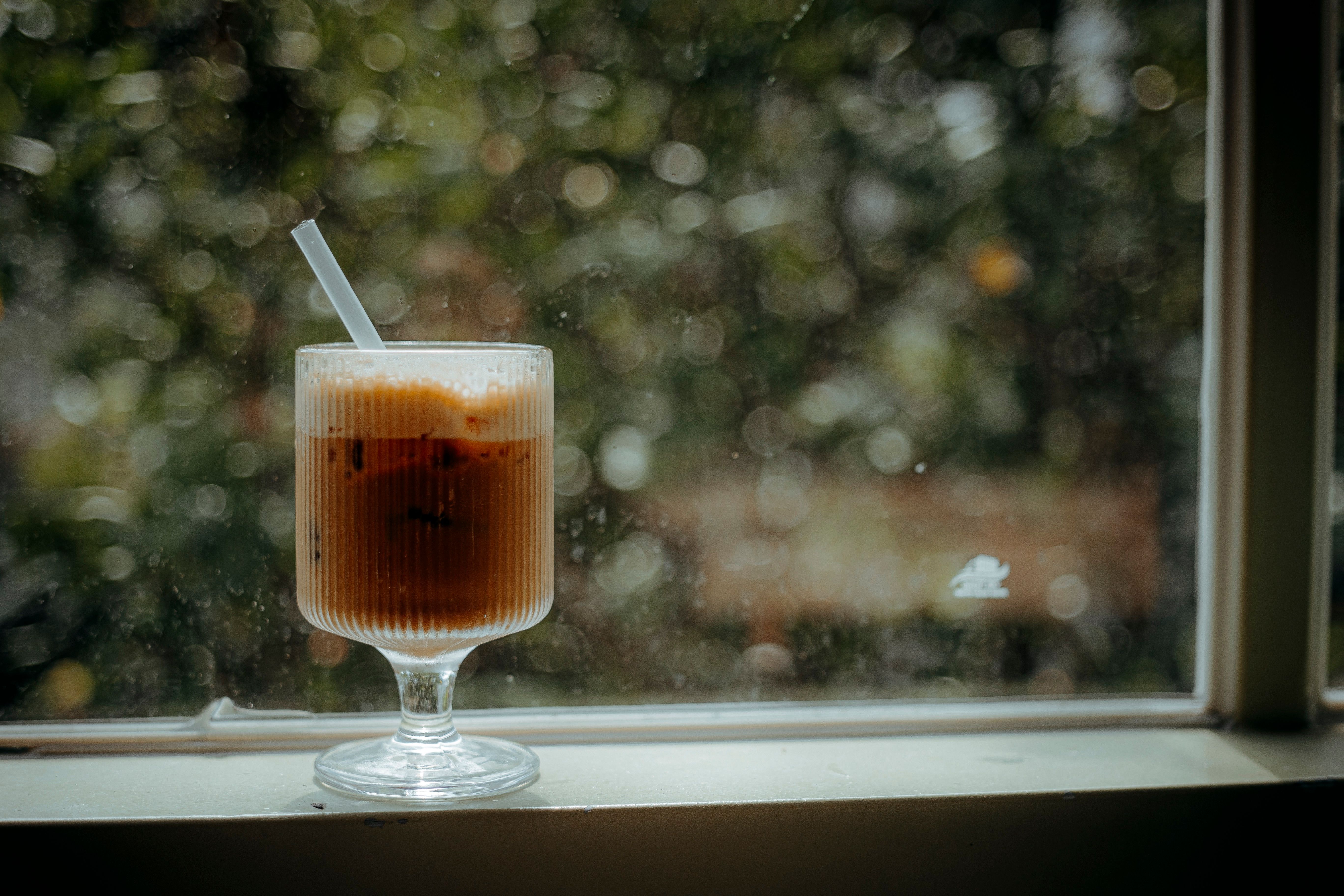Refreshing Iced Coffee on Sunny Window Sill · Free Stock Photo