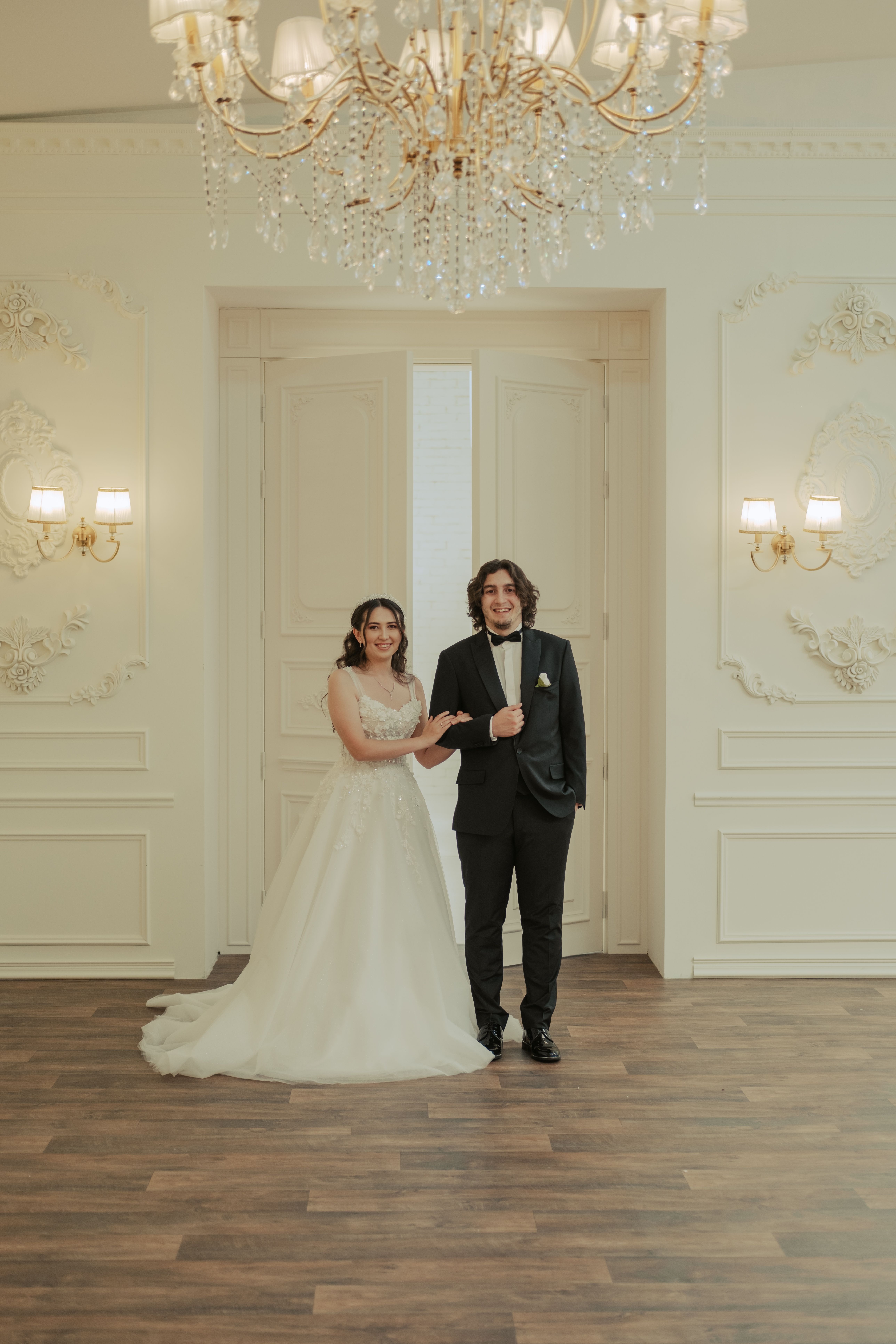 Bride and Groom Standing in front of a Palace · Free Stock Photo