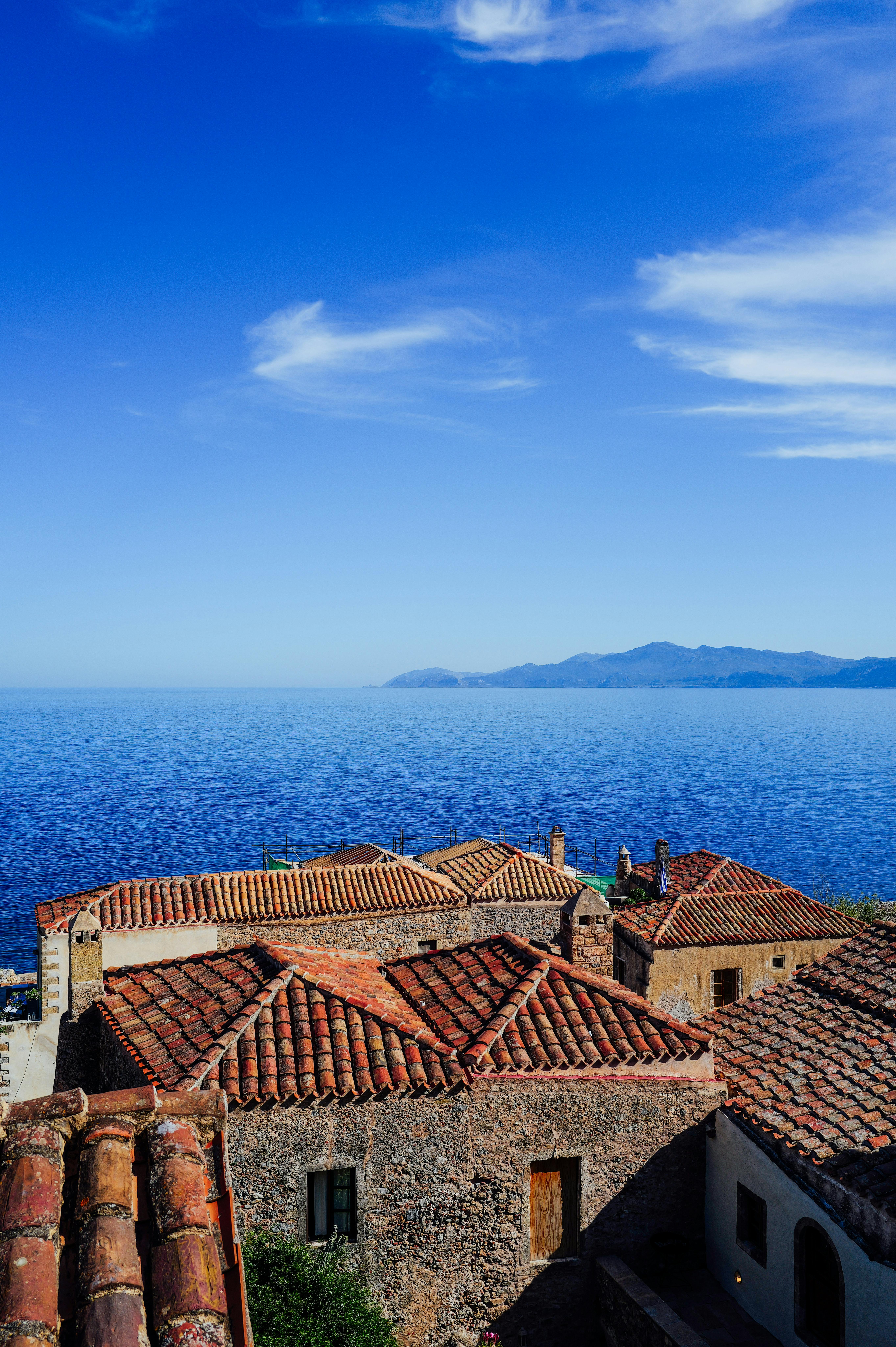 Scenic Mediterranean Rooftop View over the Sea · Free Stock Photo