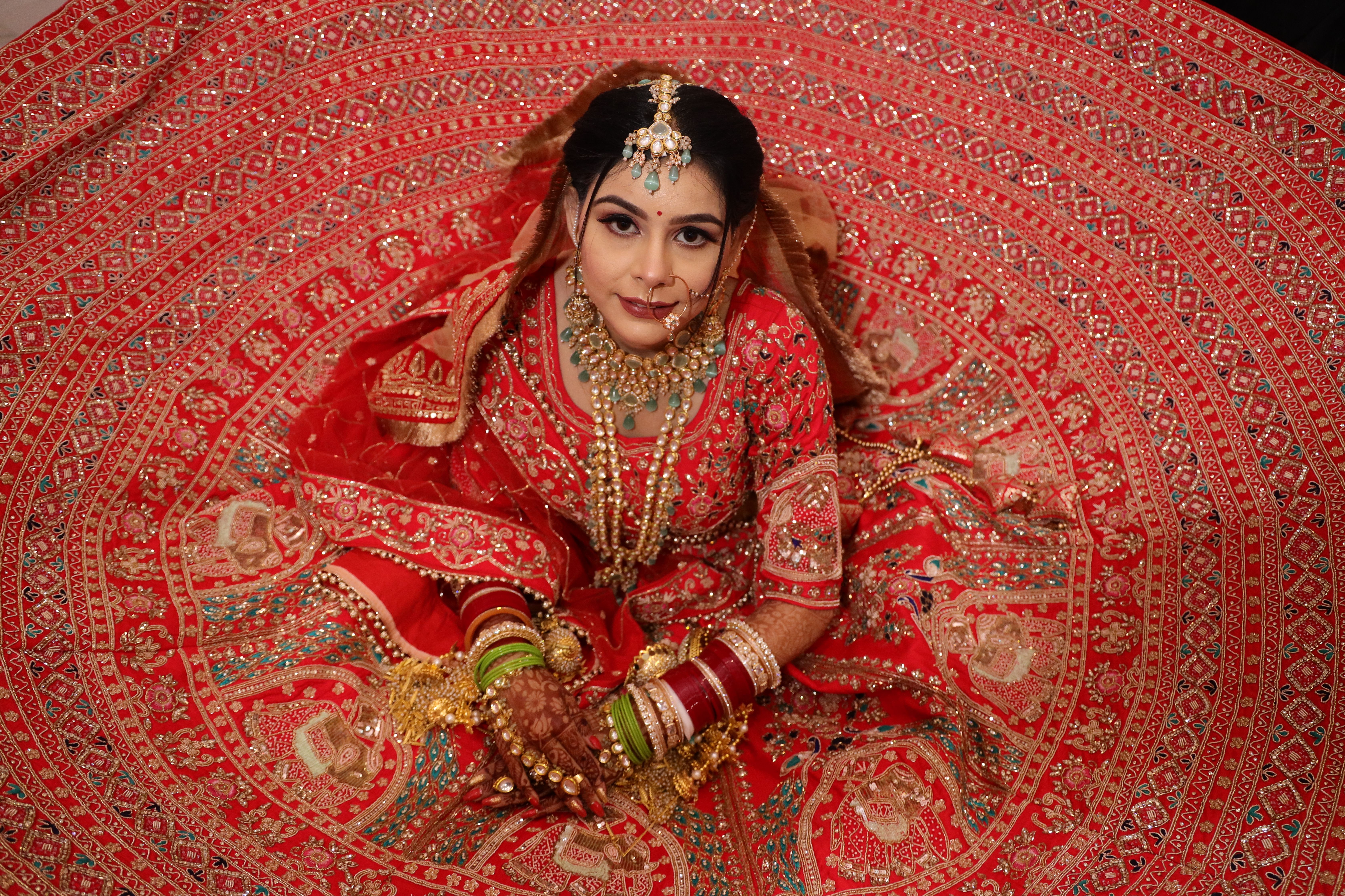 Stunning Indian Bride in Traditional Red Attire · Free Stock Photo