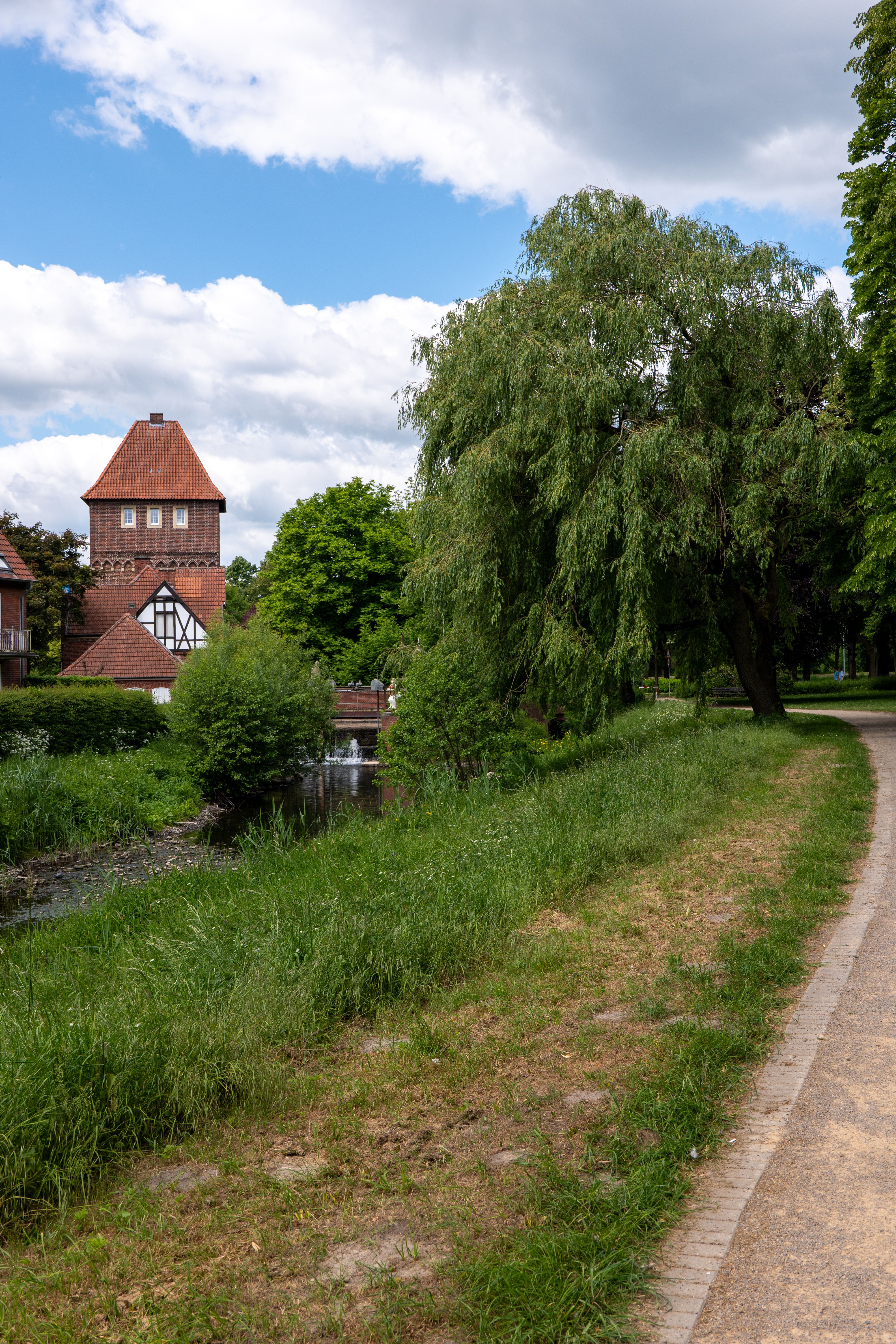 Scenic Summer Path with Tudor Style House · Free Stock Photo