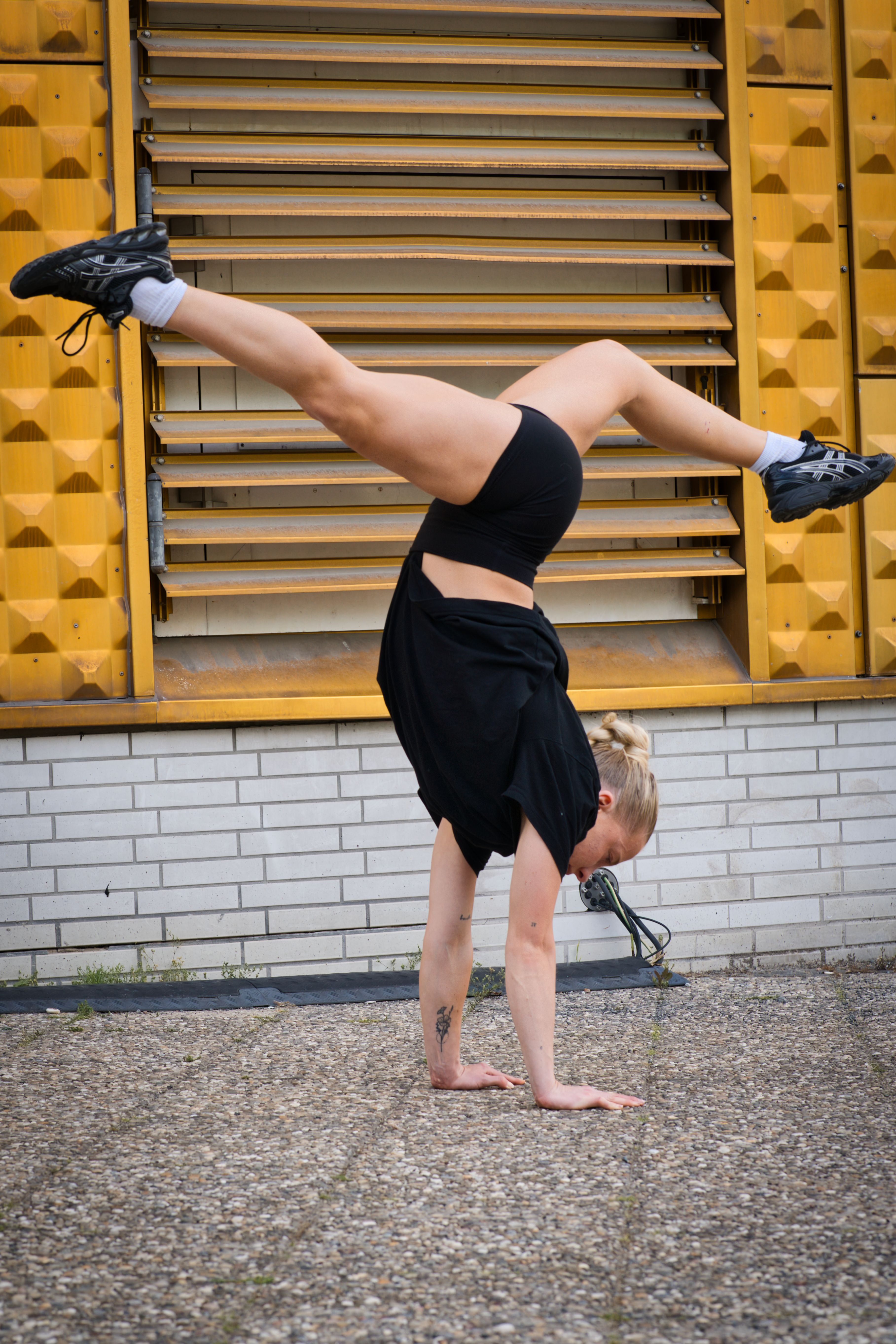 Dynamic Handstand Pose in Urban Berlin Setting · Free Stock Photo