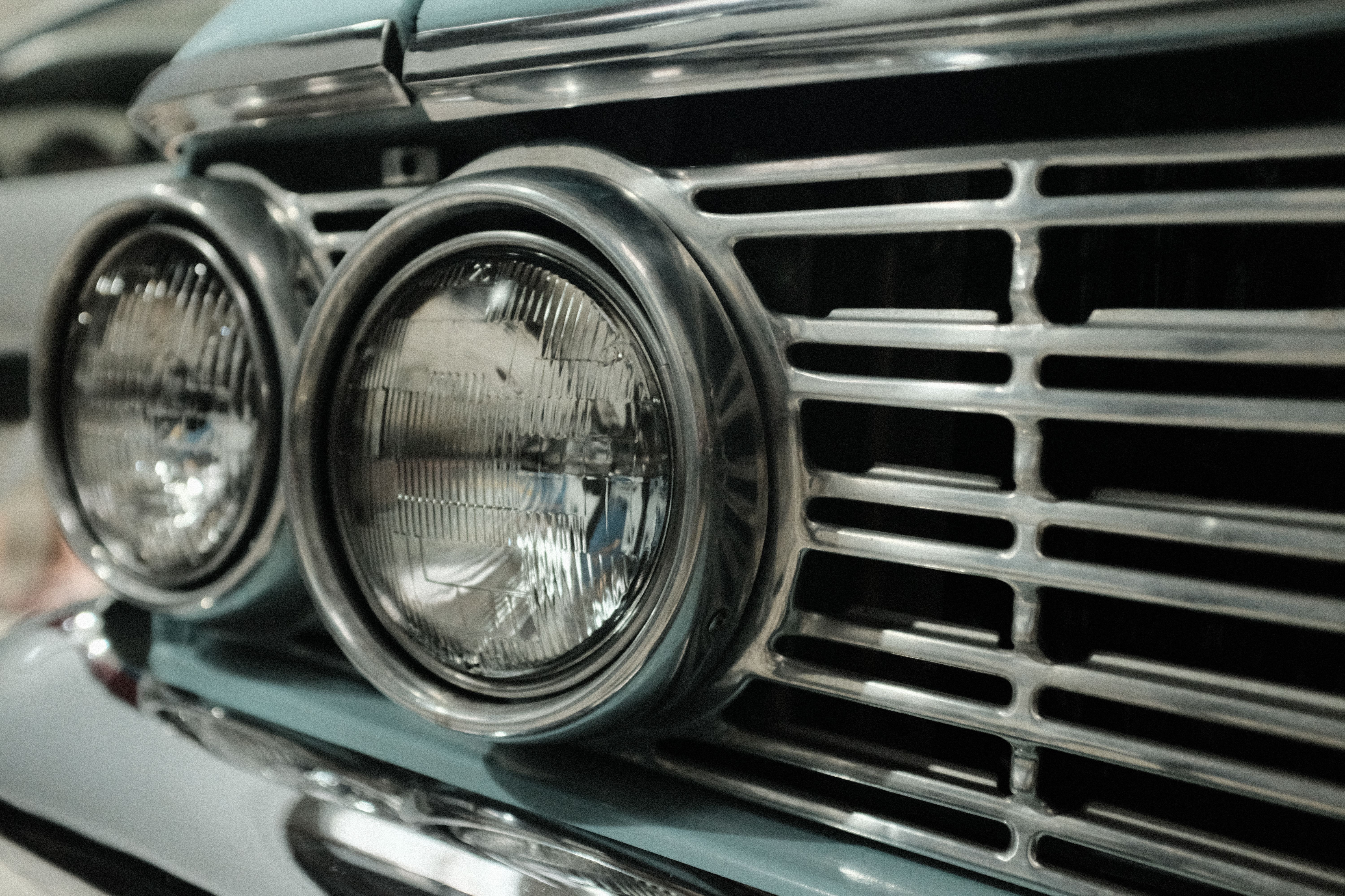Close-up of Vintage Car Headlights and Grill · Free Stock Photo