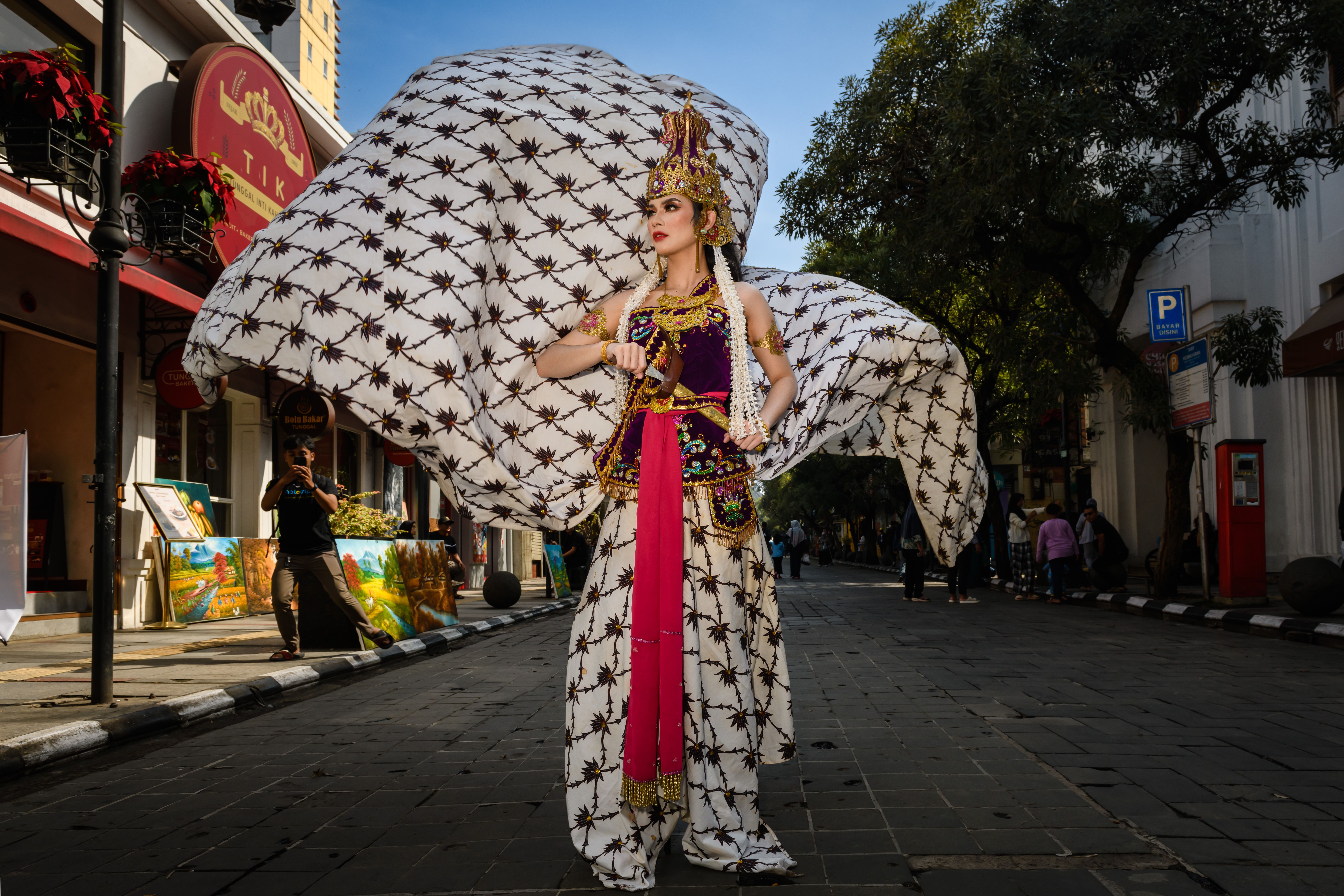 Traditional Cultural Dance Costume in Urban Setting · Free Stock Photo
