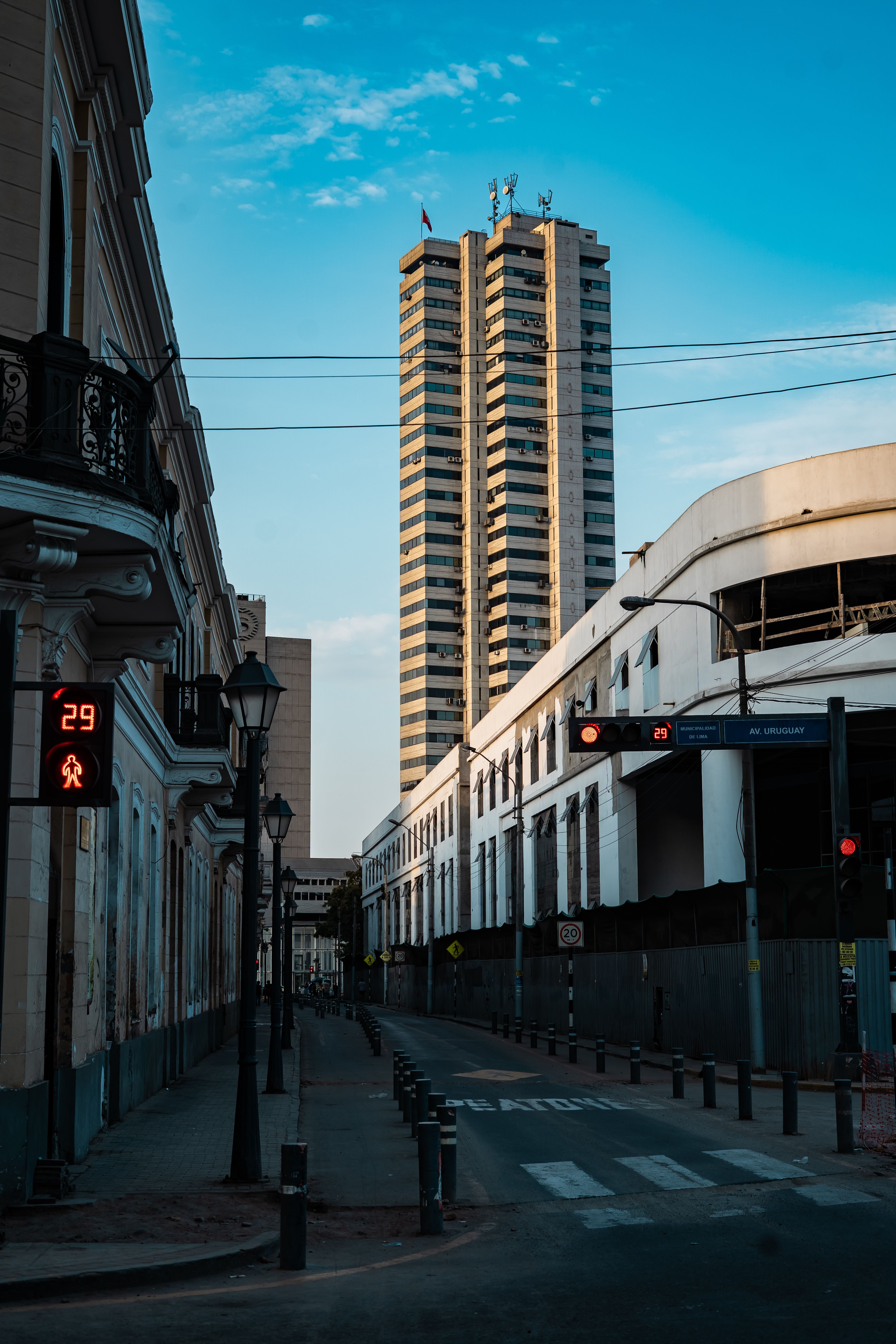 Historic Lima Street with Modern Skyscraper · Free Stock Photo
