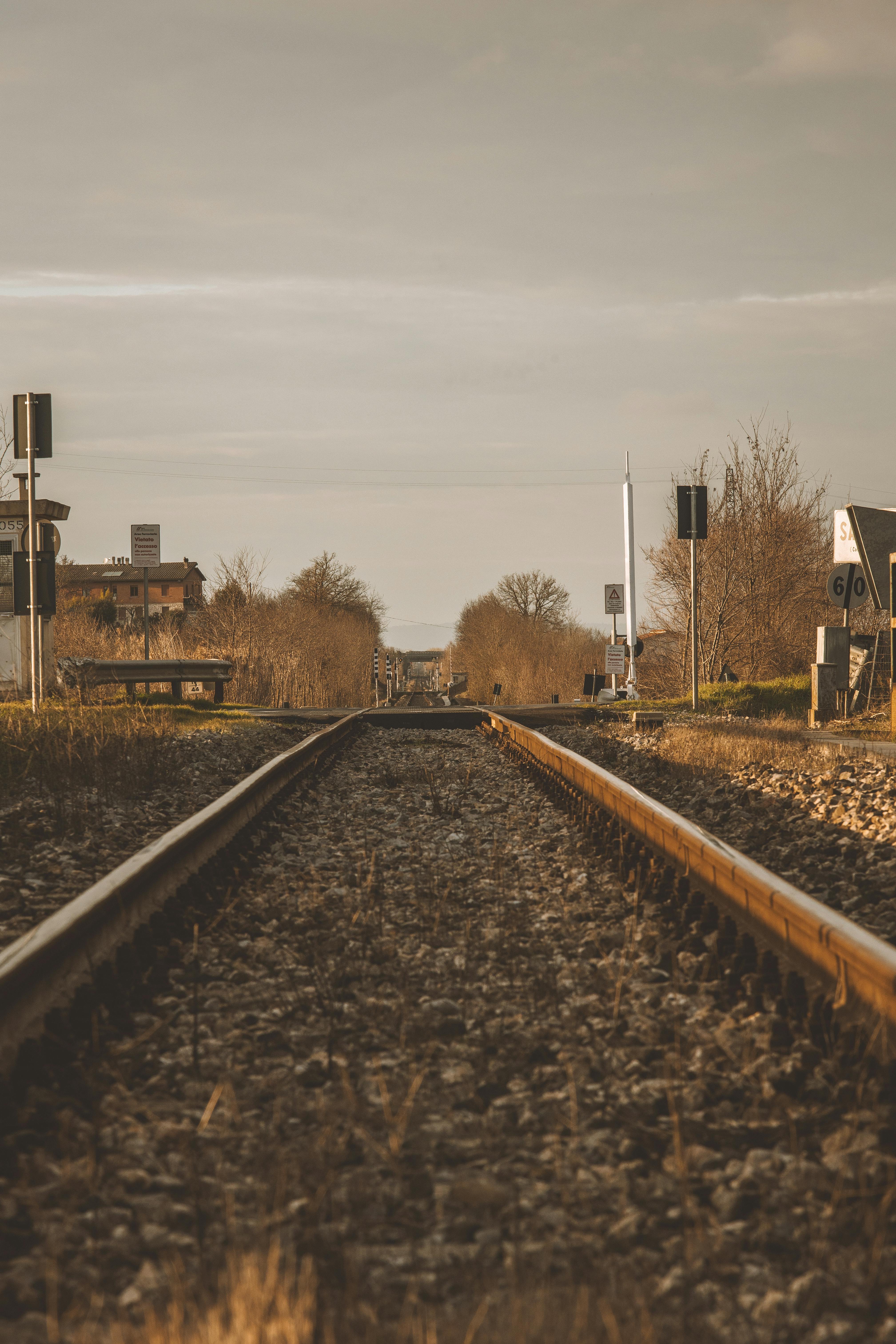 Rustic Railway Tracks at Golden Hour · Free Stock Photo
