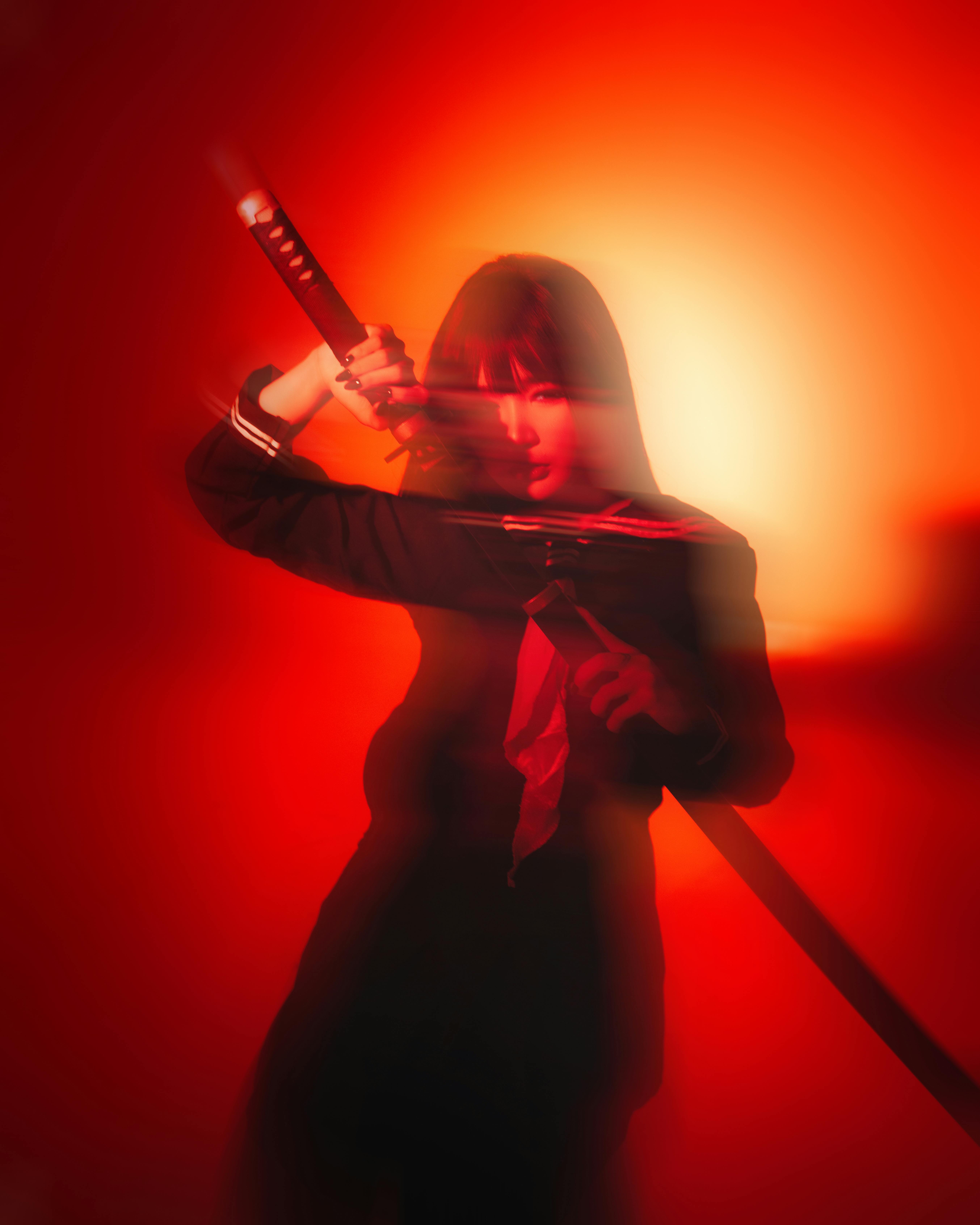 Dynamic Portrait of Woman with Katana · Free Stock Photo