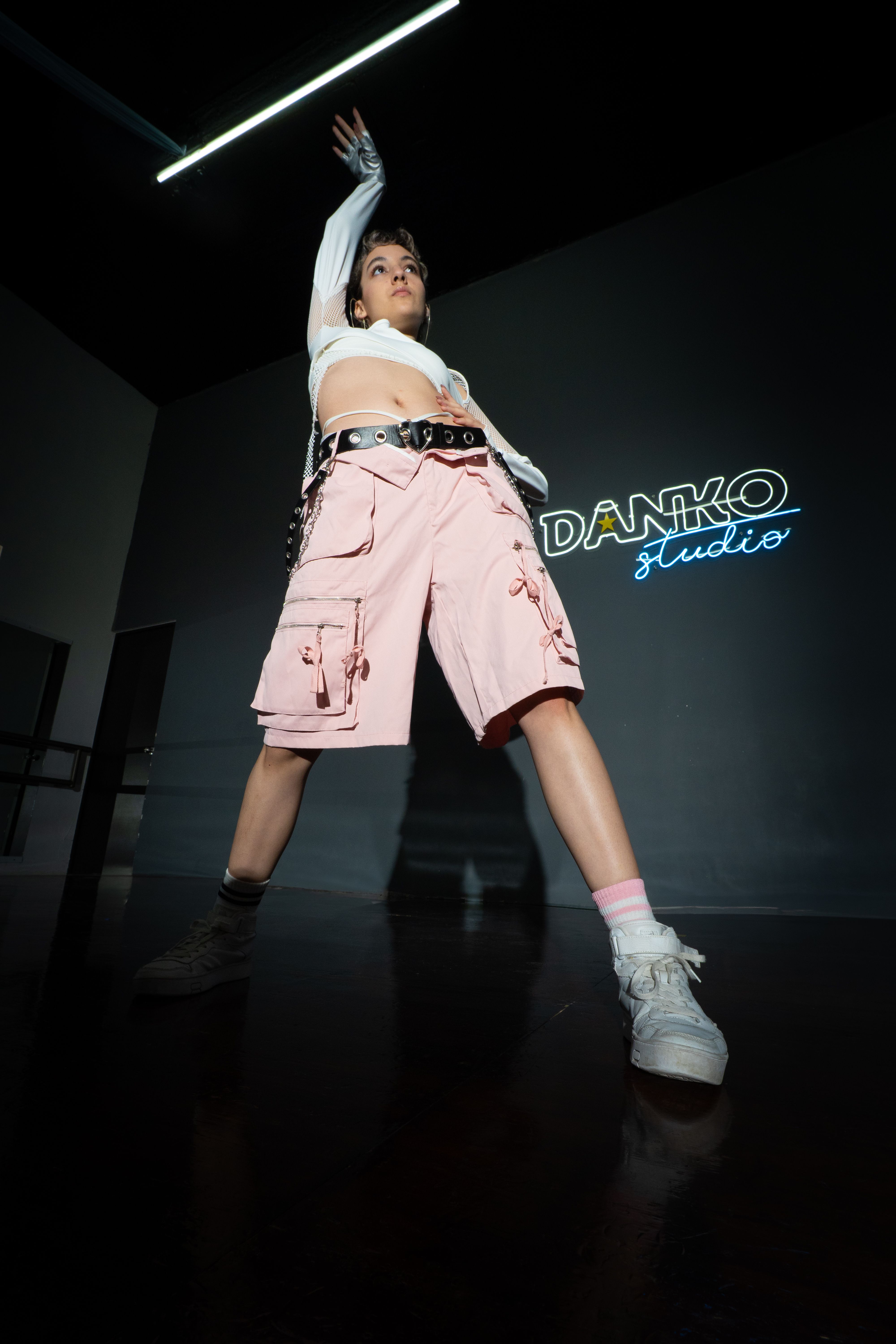 Dynamic Female Dancer in Studio Setting · Free Stock Photo