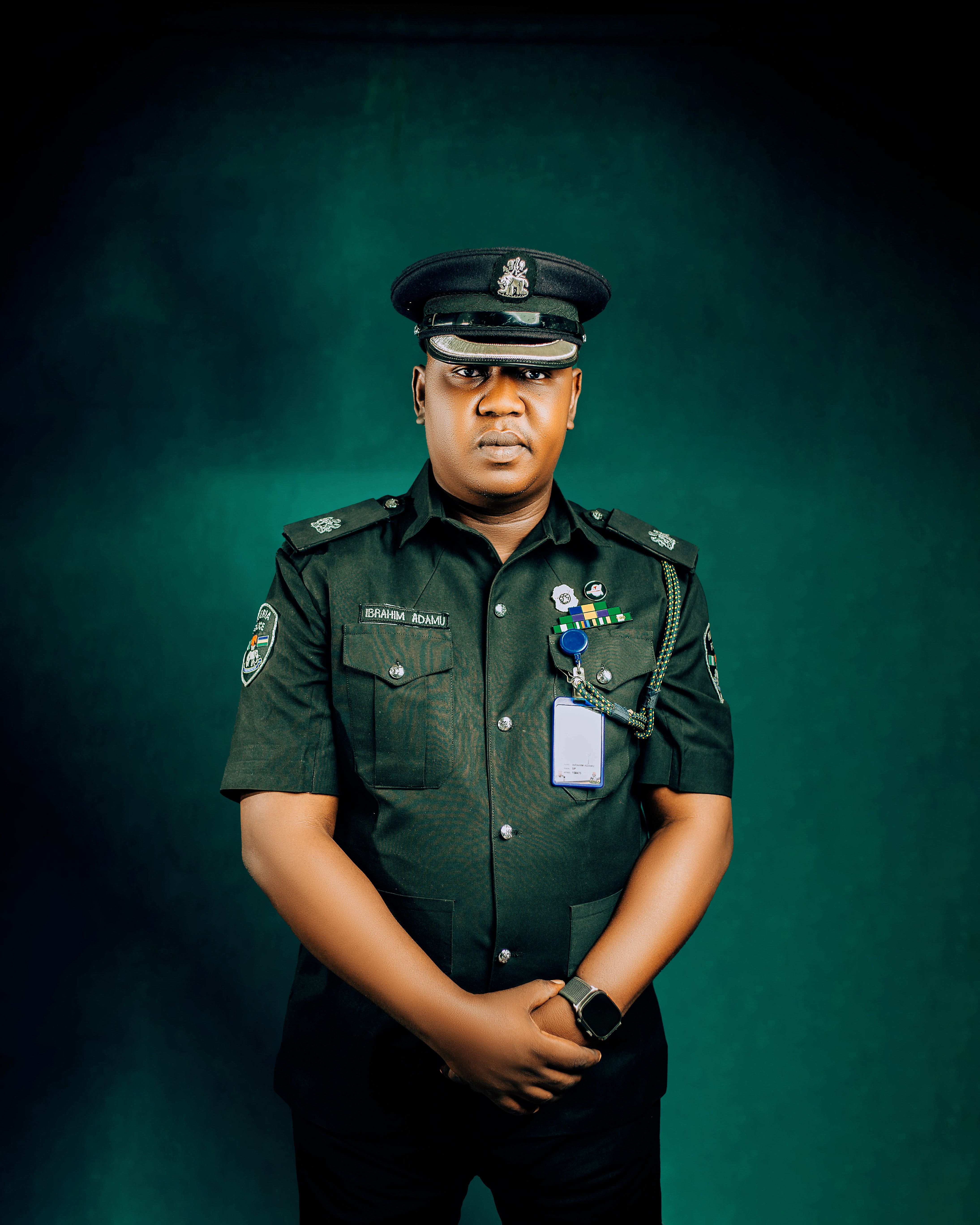 African Police Officer in Uniform Outdoors · Free Stock Photo