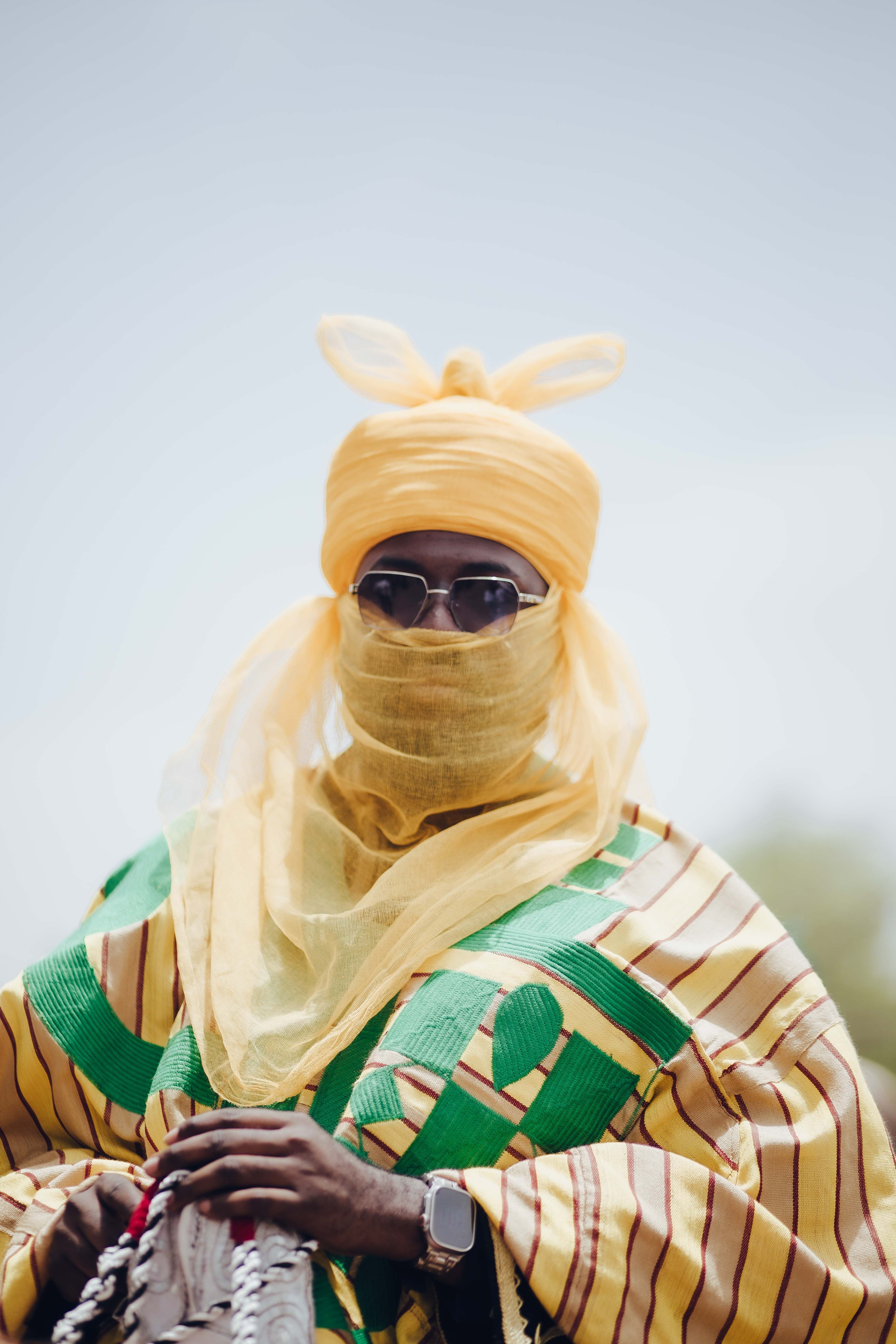 Colorful Traditional African Garb Street Scene · Free Stock Photo