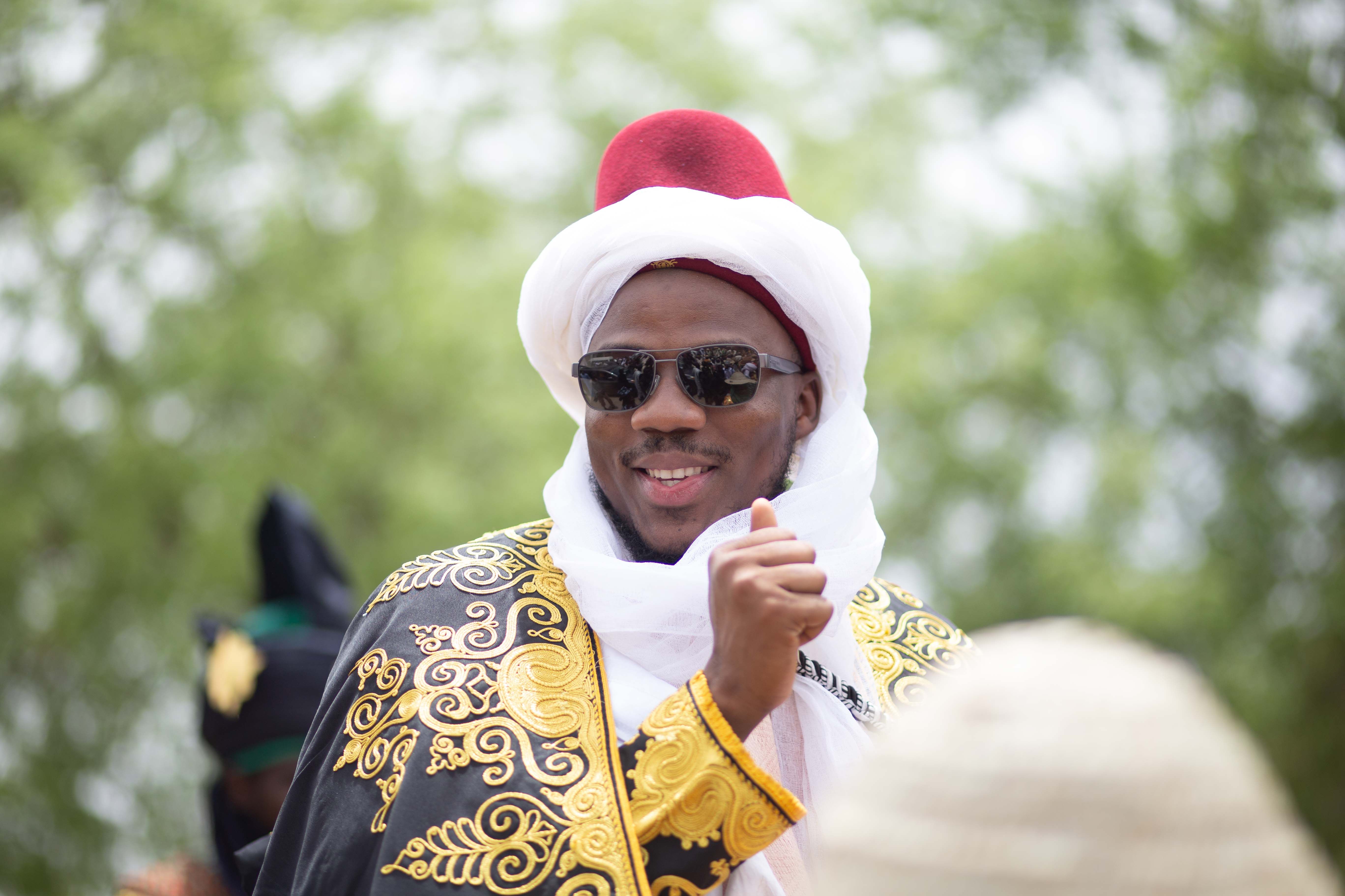 Traditional Nigerian Attire with Red Fez Hat · Free Stock Photo