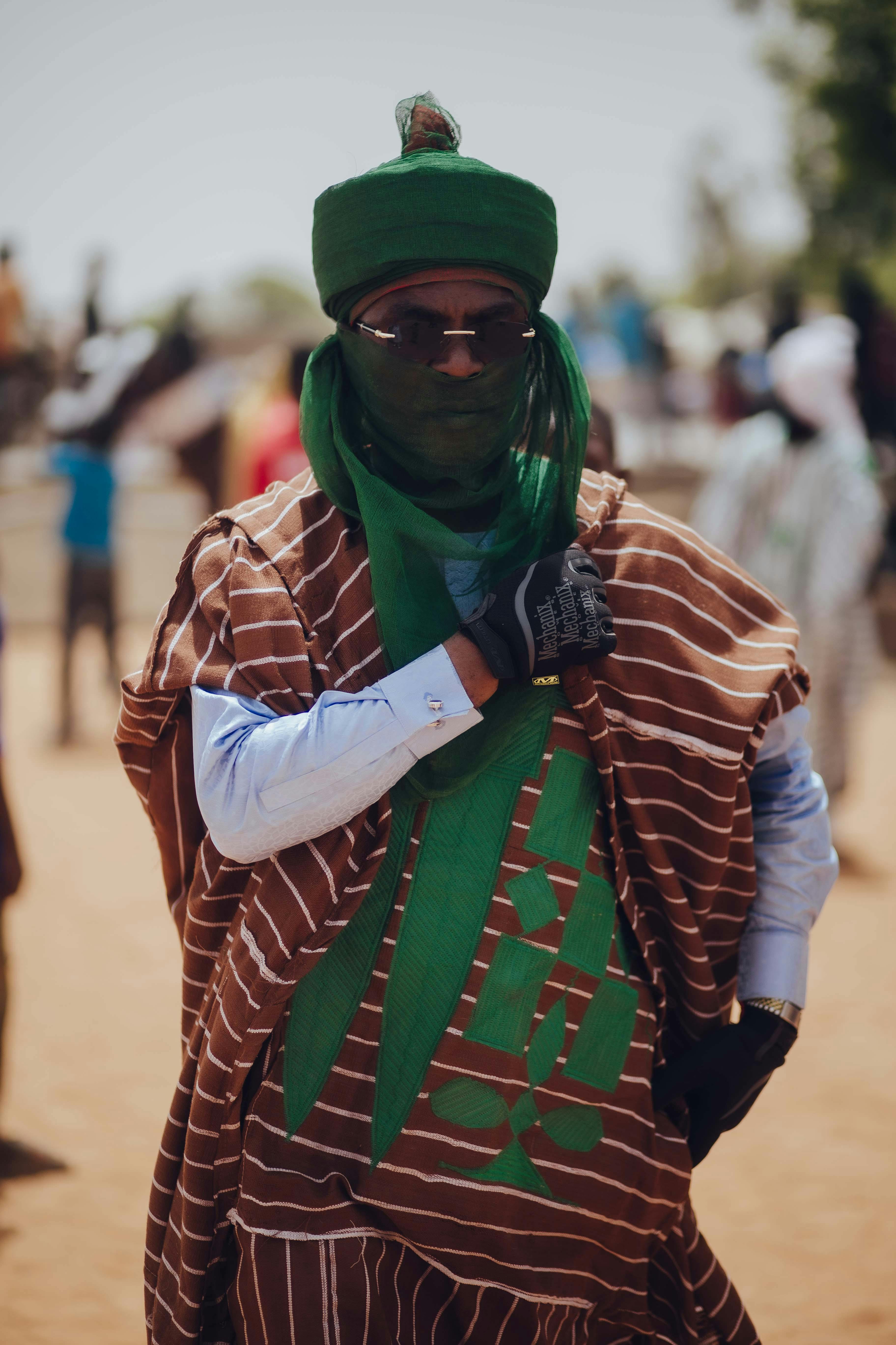 Traditional Hausa Attire at Outdoor Festival · Free Stock Photo