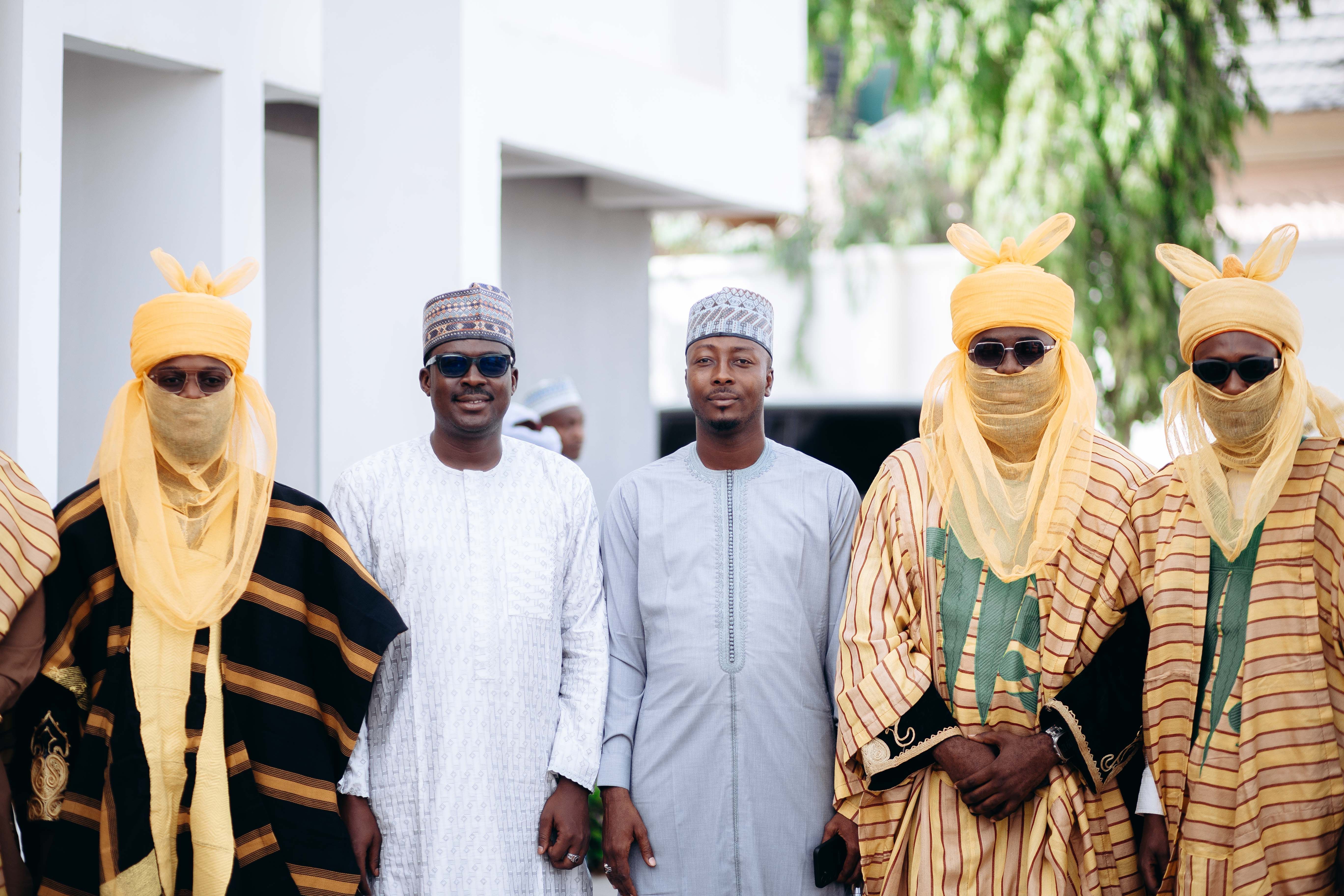 Traditional Nigerian Attire Celebration with Group · Free Stock Photo
