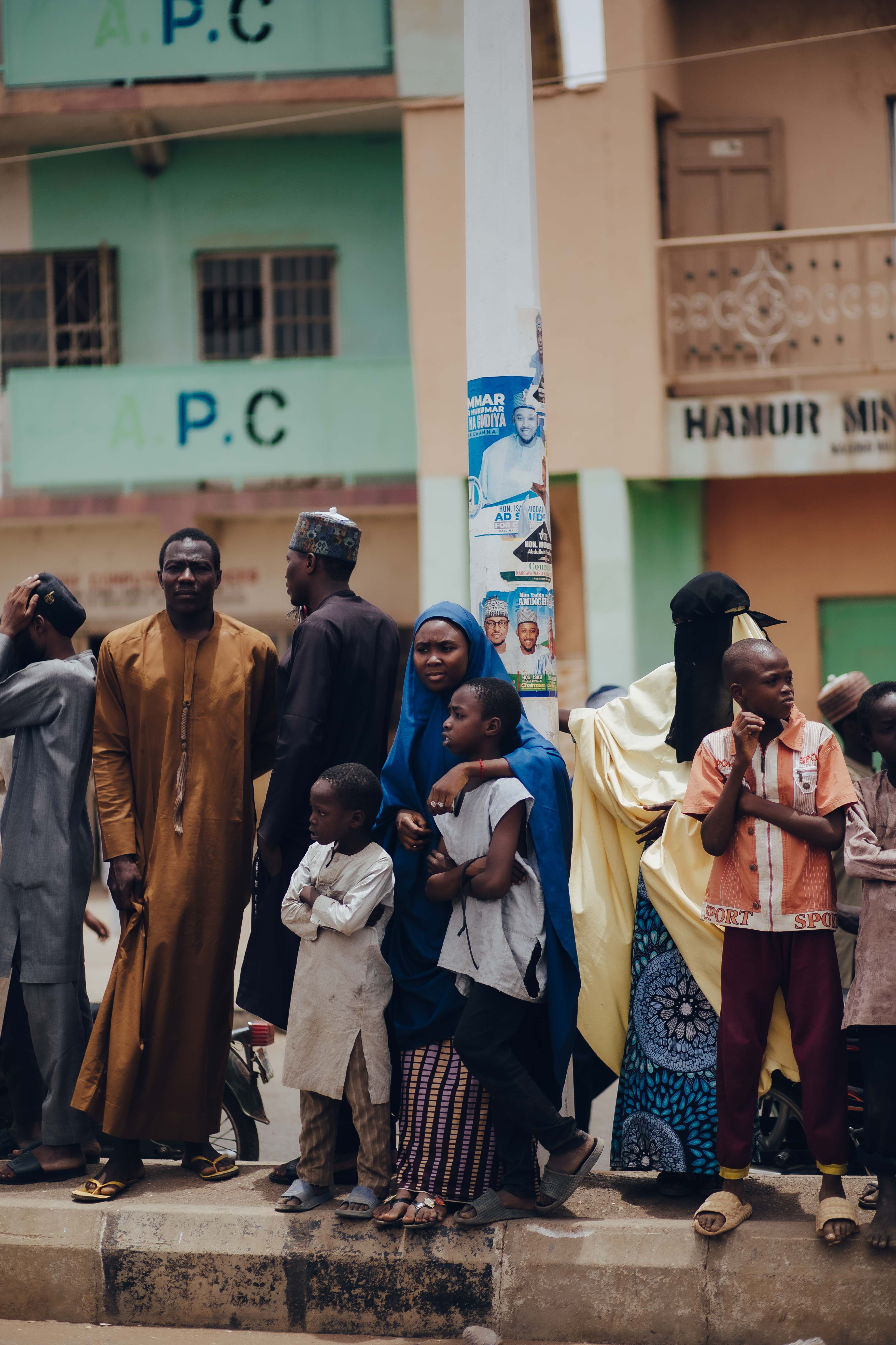 Group of People Standing on Nigerian Street · Free Stock Photo