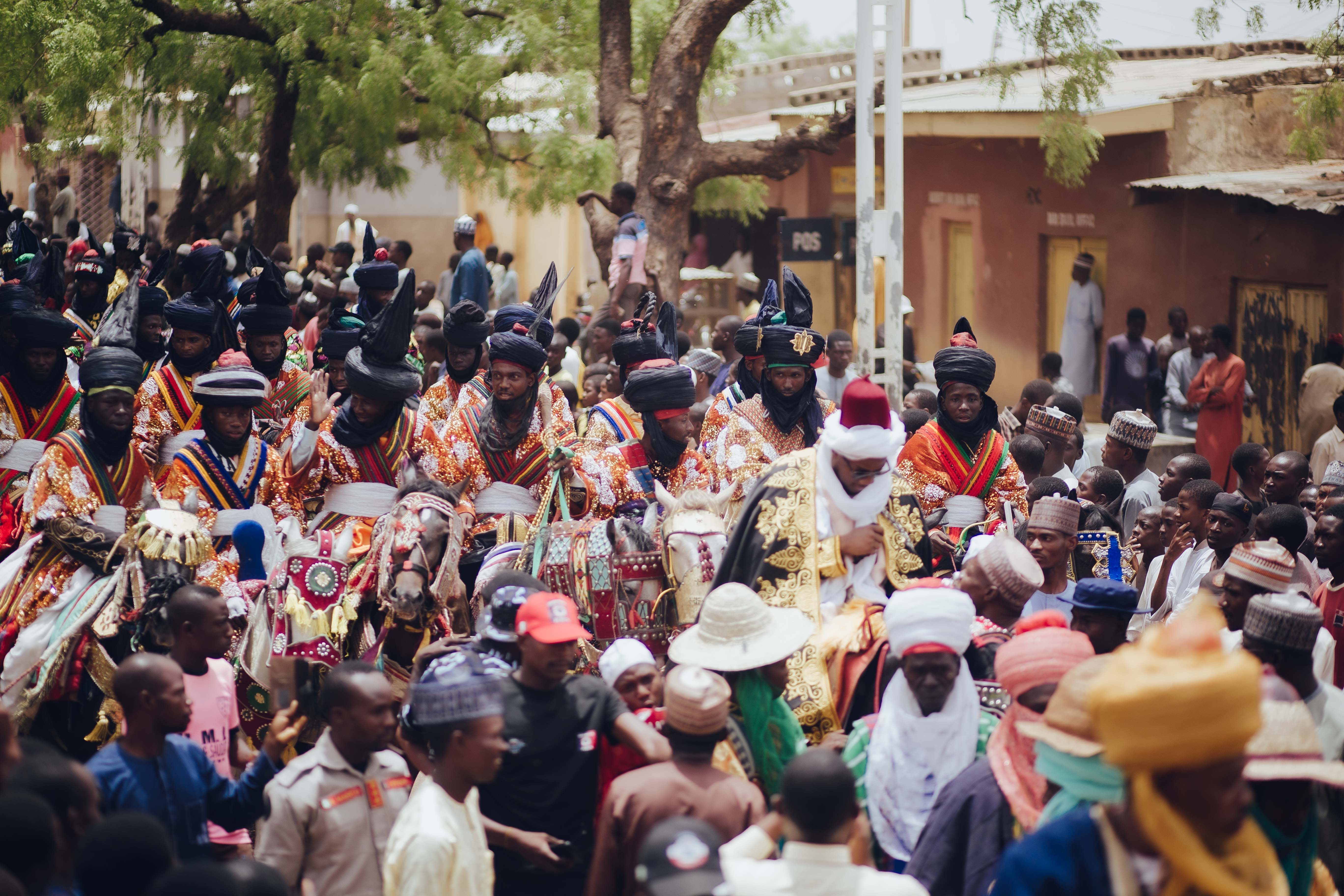 Colorful Nigerian Cultural Parade with Horses · Free Stock Photo