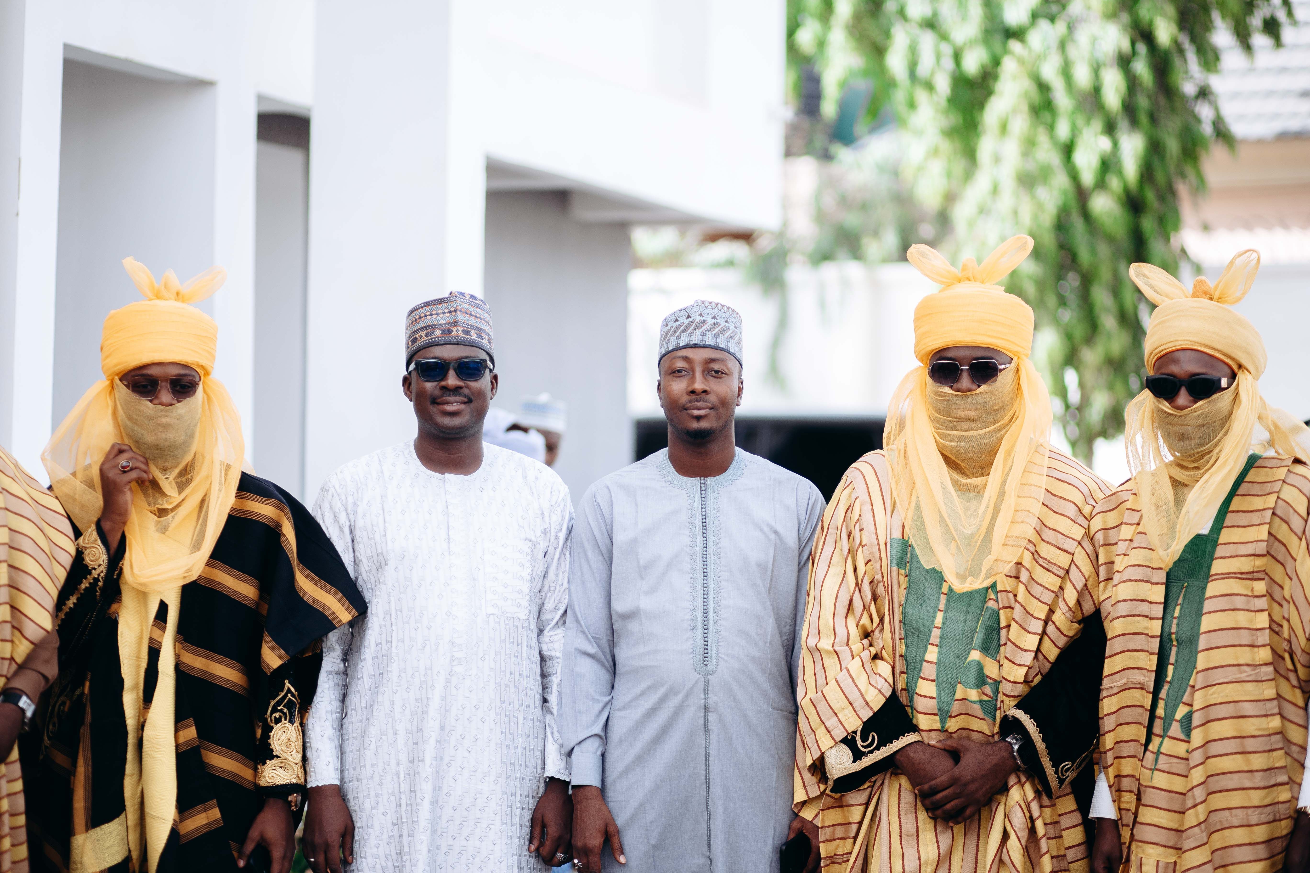 Traditional Nigerian Attire Group Portrait Outdoors · Free Stock Photo
