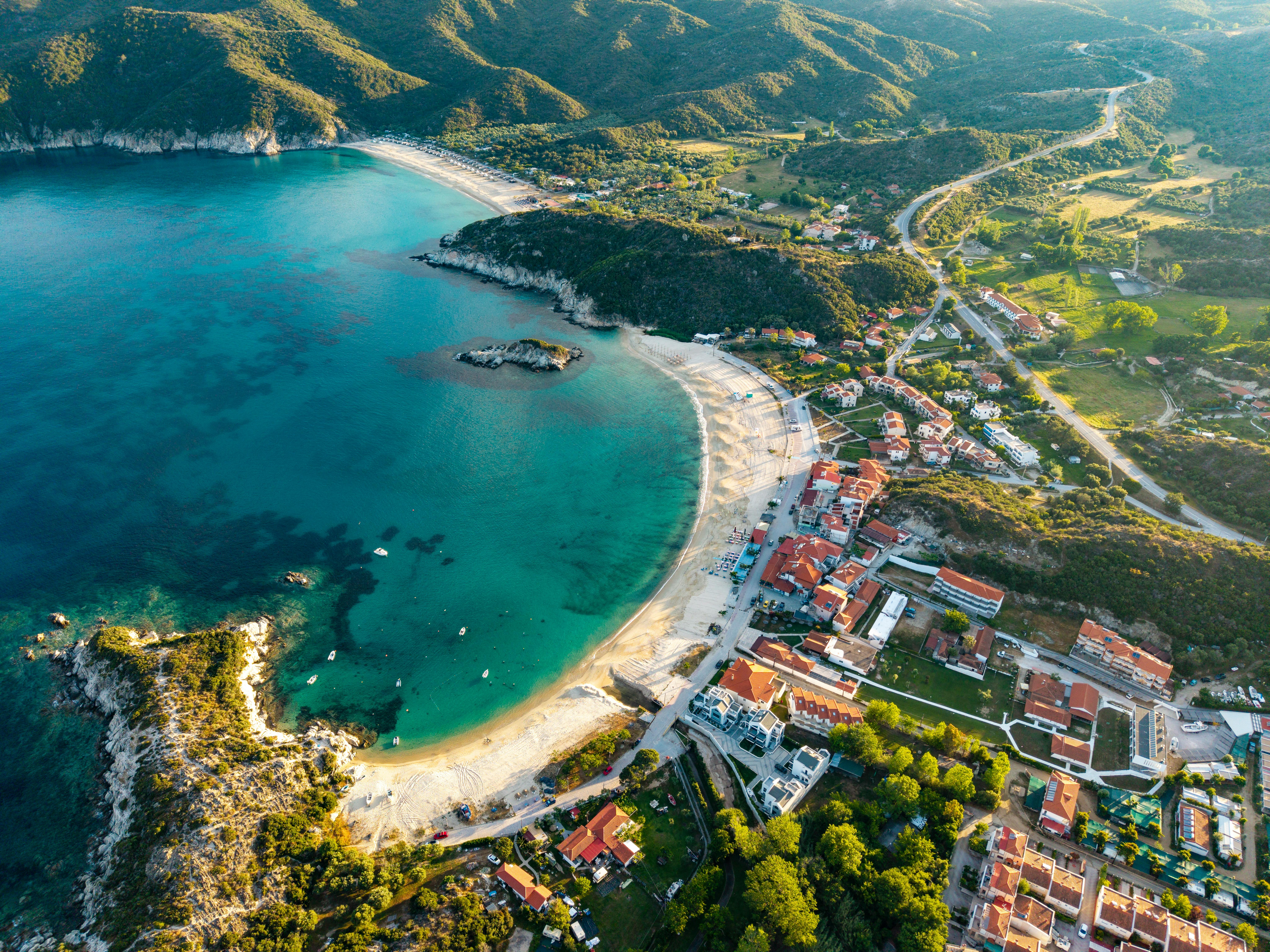 Aerial View of Vibrant Kalamitsi Beach in Greece · Free Stock Photo