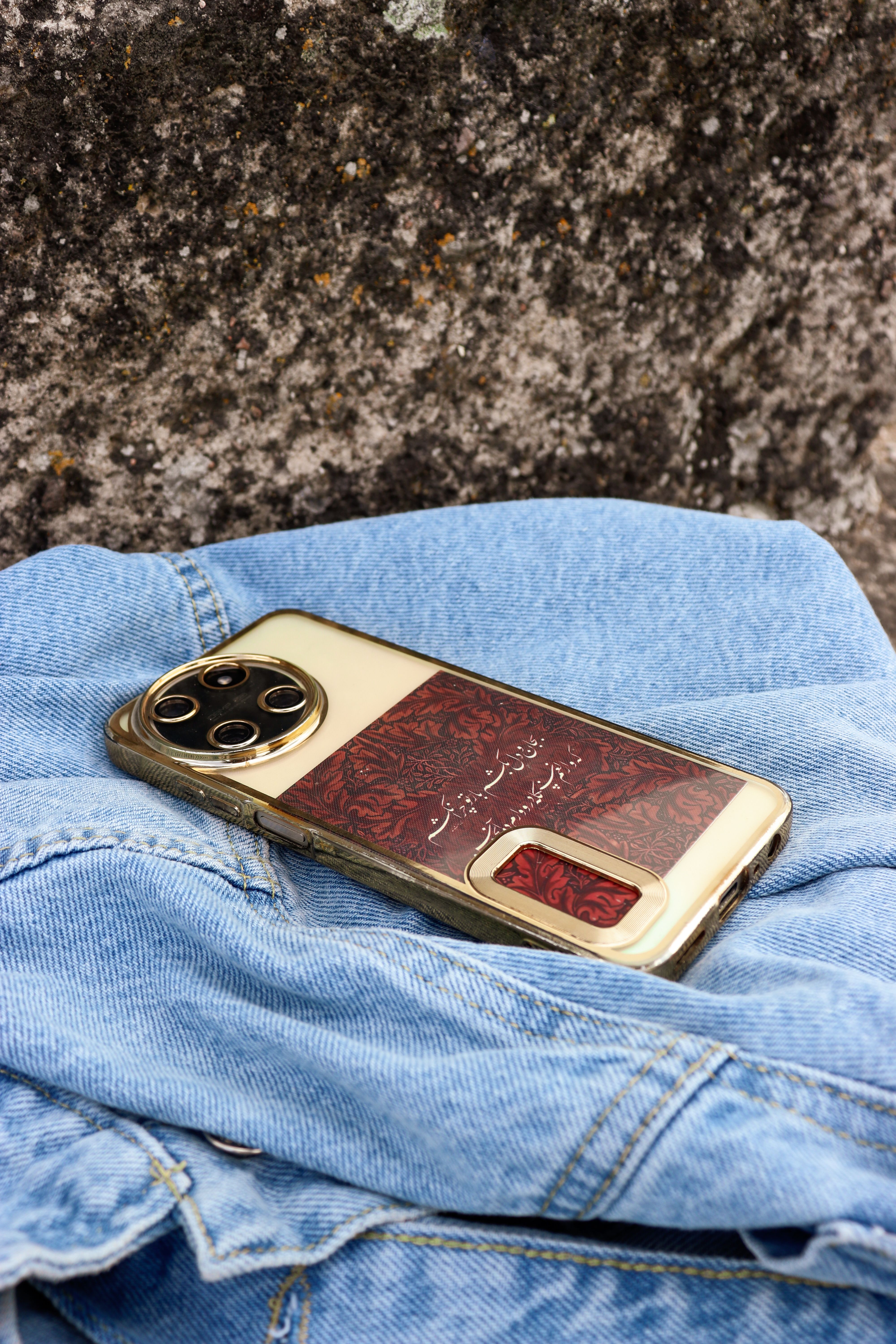 Smartphone with Artistic Case on Denim · Free Stock Photo