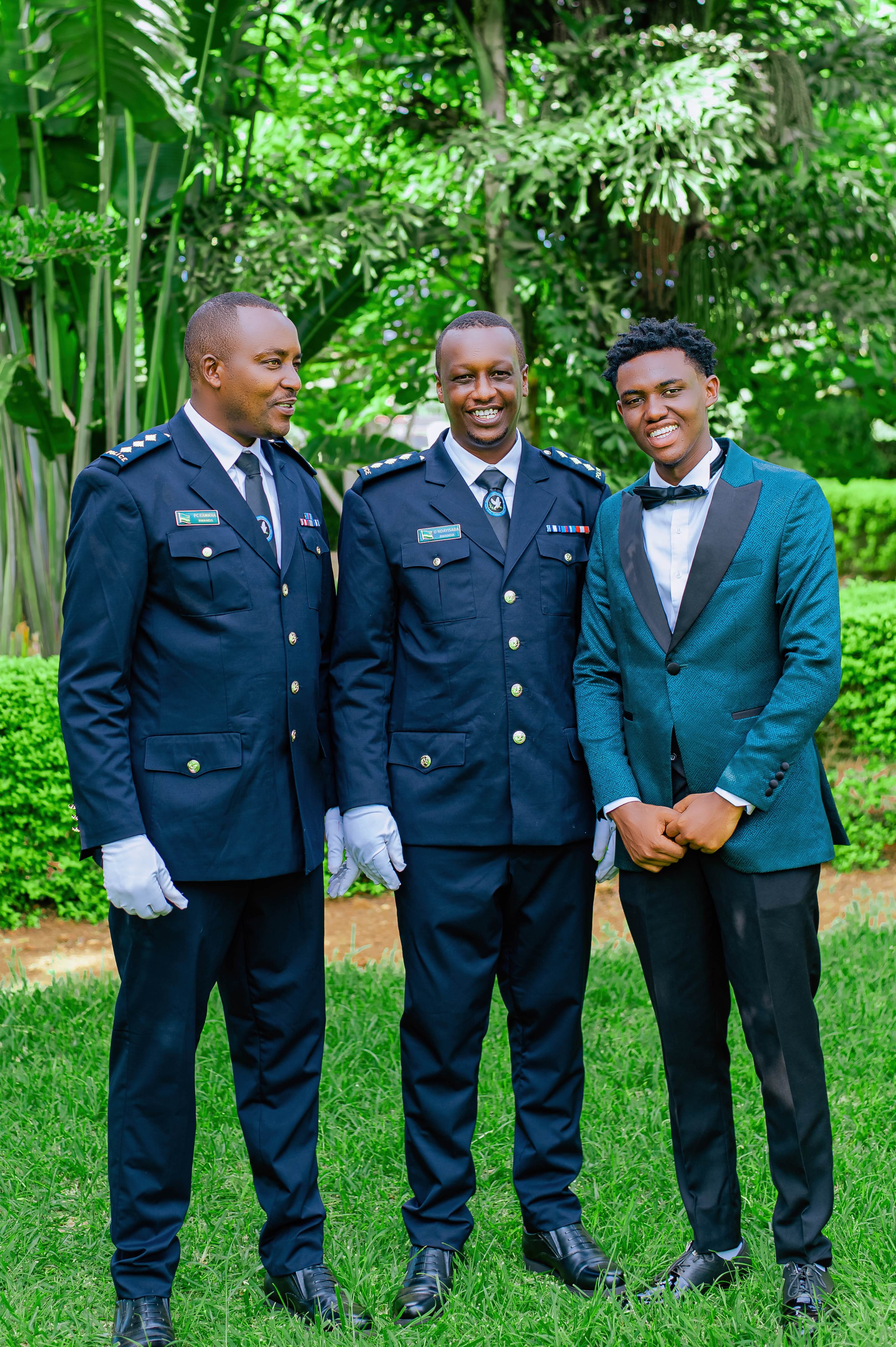 Police officers and a young man outdoors in formal attire · Free Stock ...
