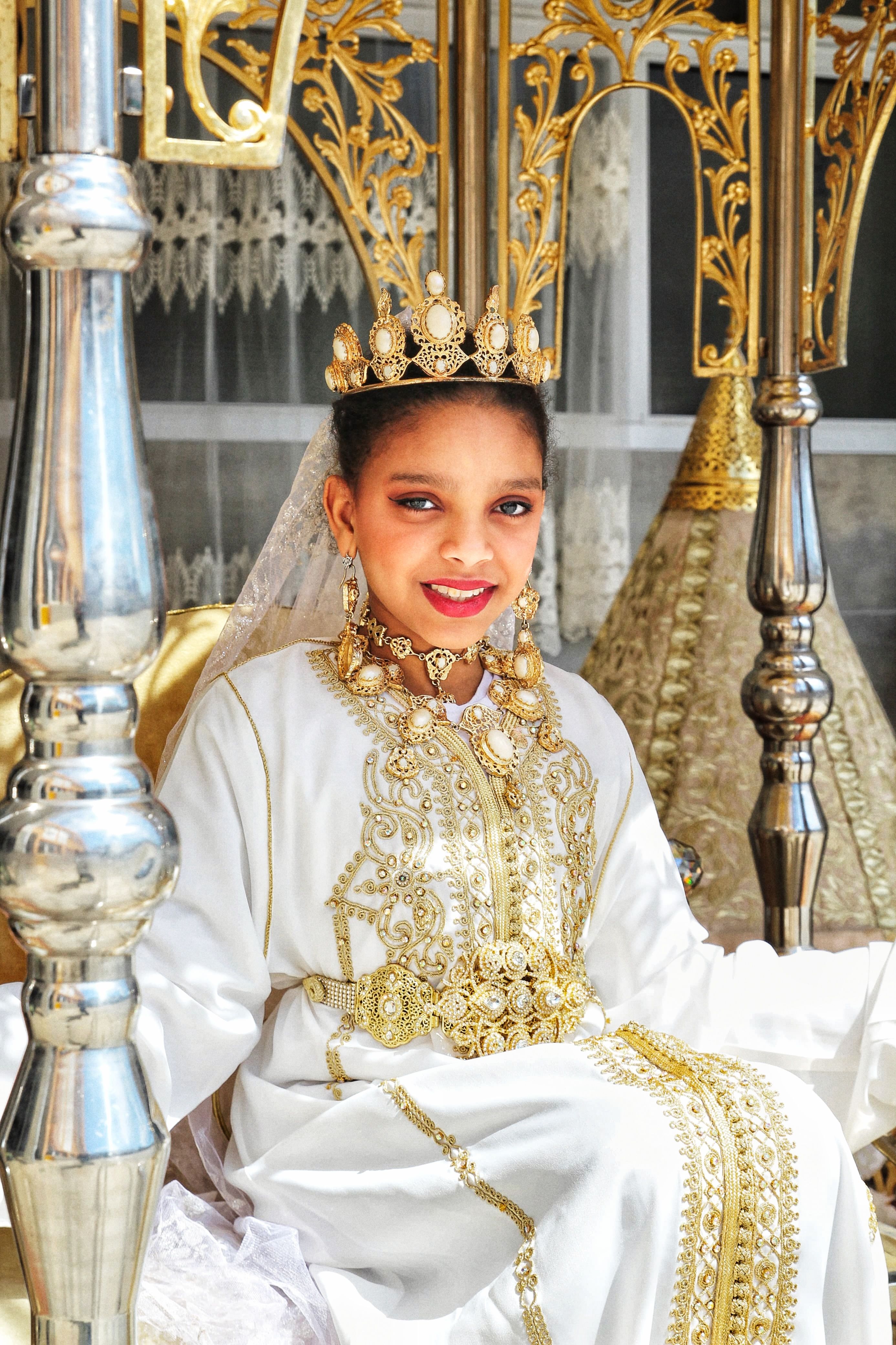 Young Girl in Traditional Moroccan Attire with Crown · Free Stock Photo