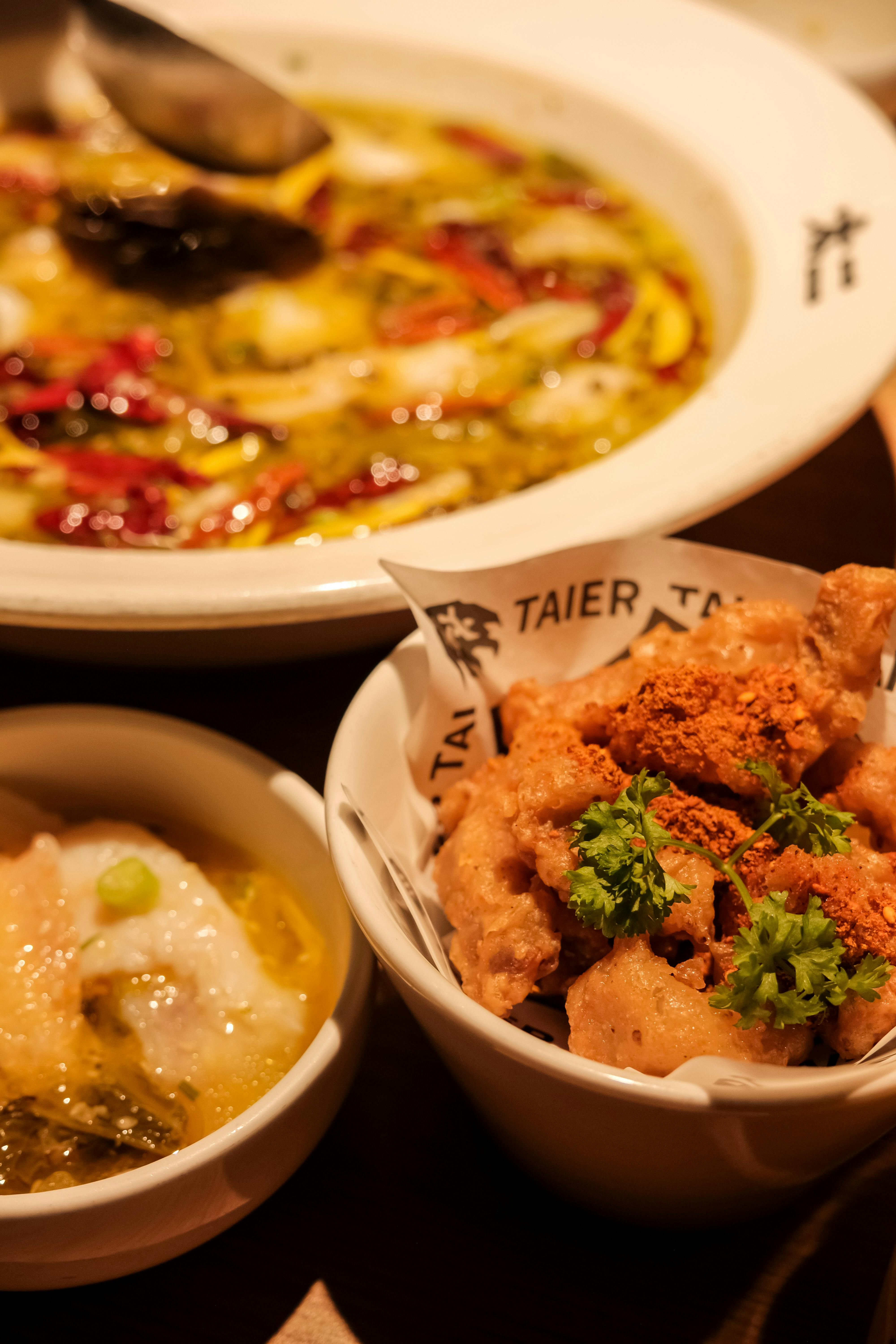 Delicious Asian Fusion Dishes on a Table · Free Stock Photo